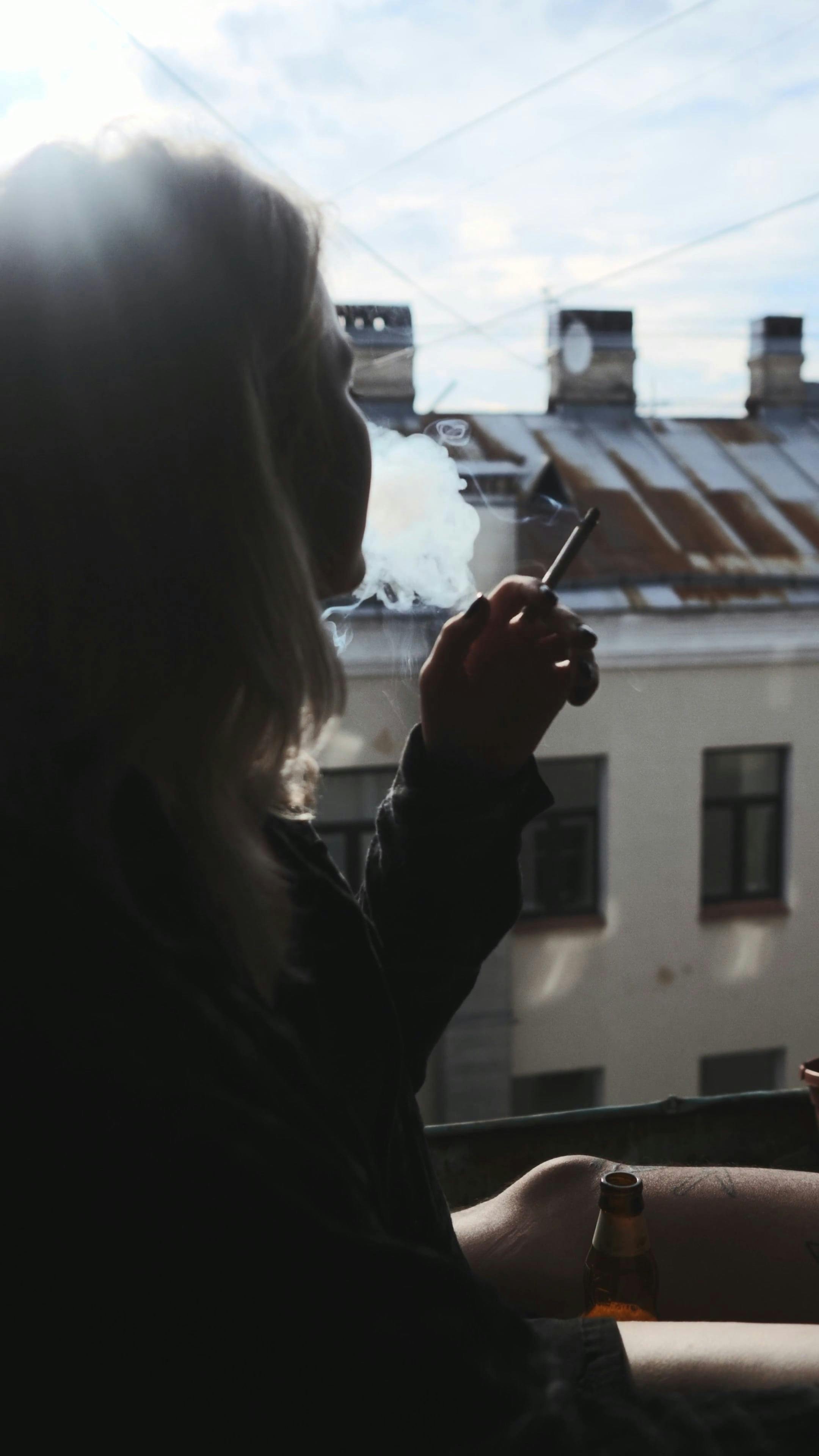 Couple Having a Smoke · Free Stock Video