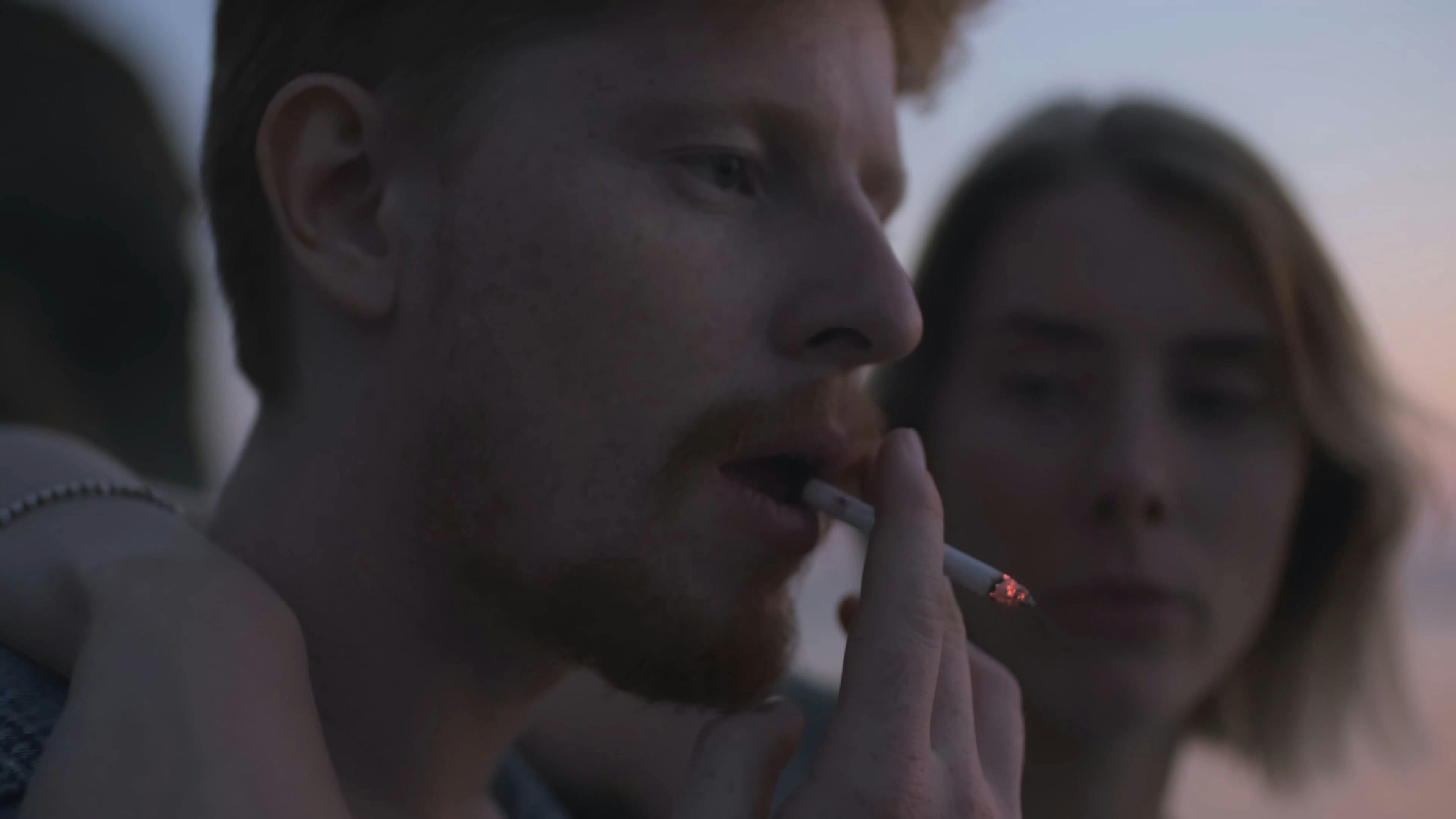 Couple Having a Smoke · Free Stock Video