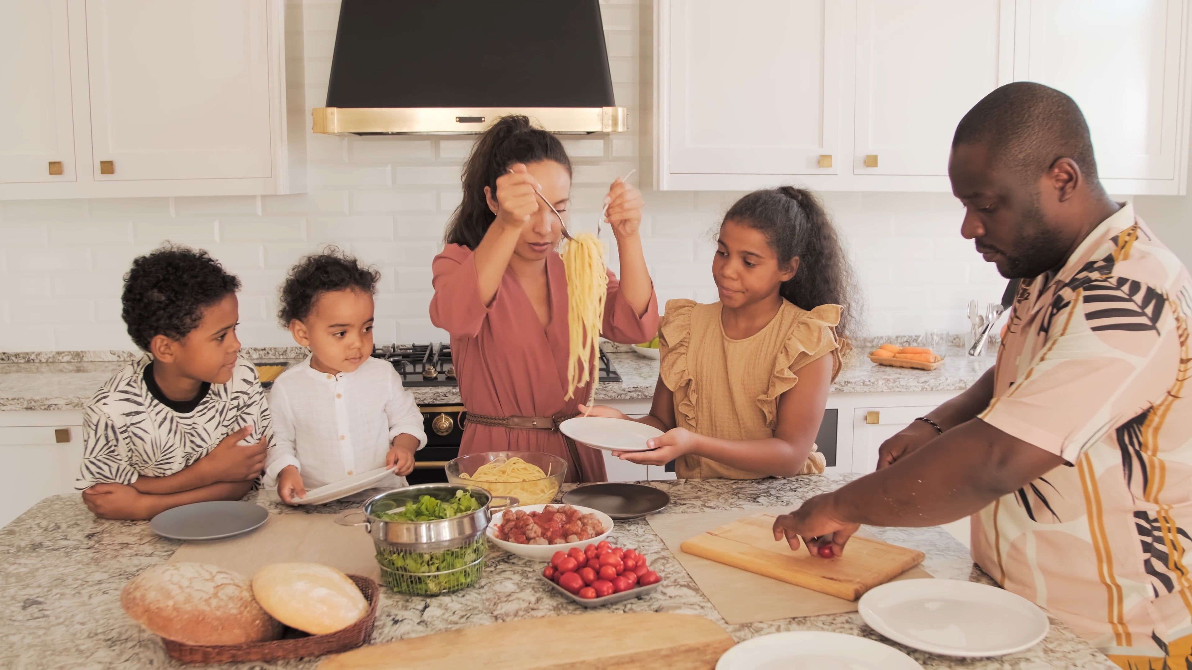 A Family Preparing a Meal Together · Free Stock Video