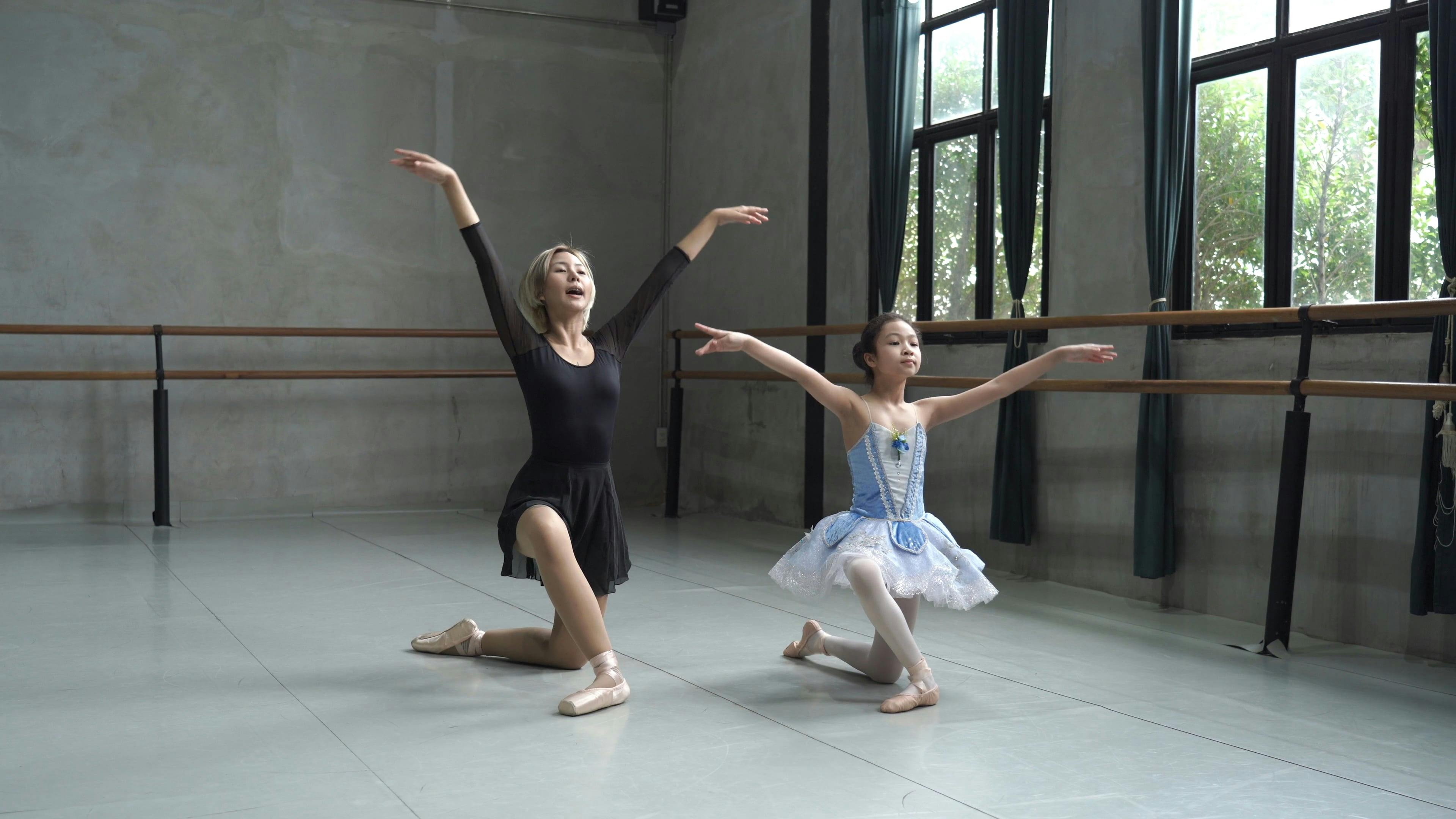 Woman Teaching Ballet Moves to a Girl · Free Stock Video