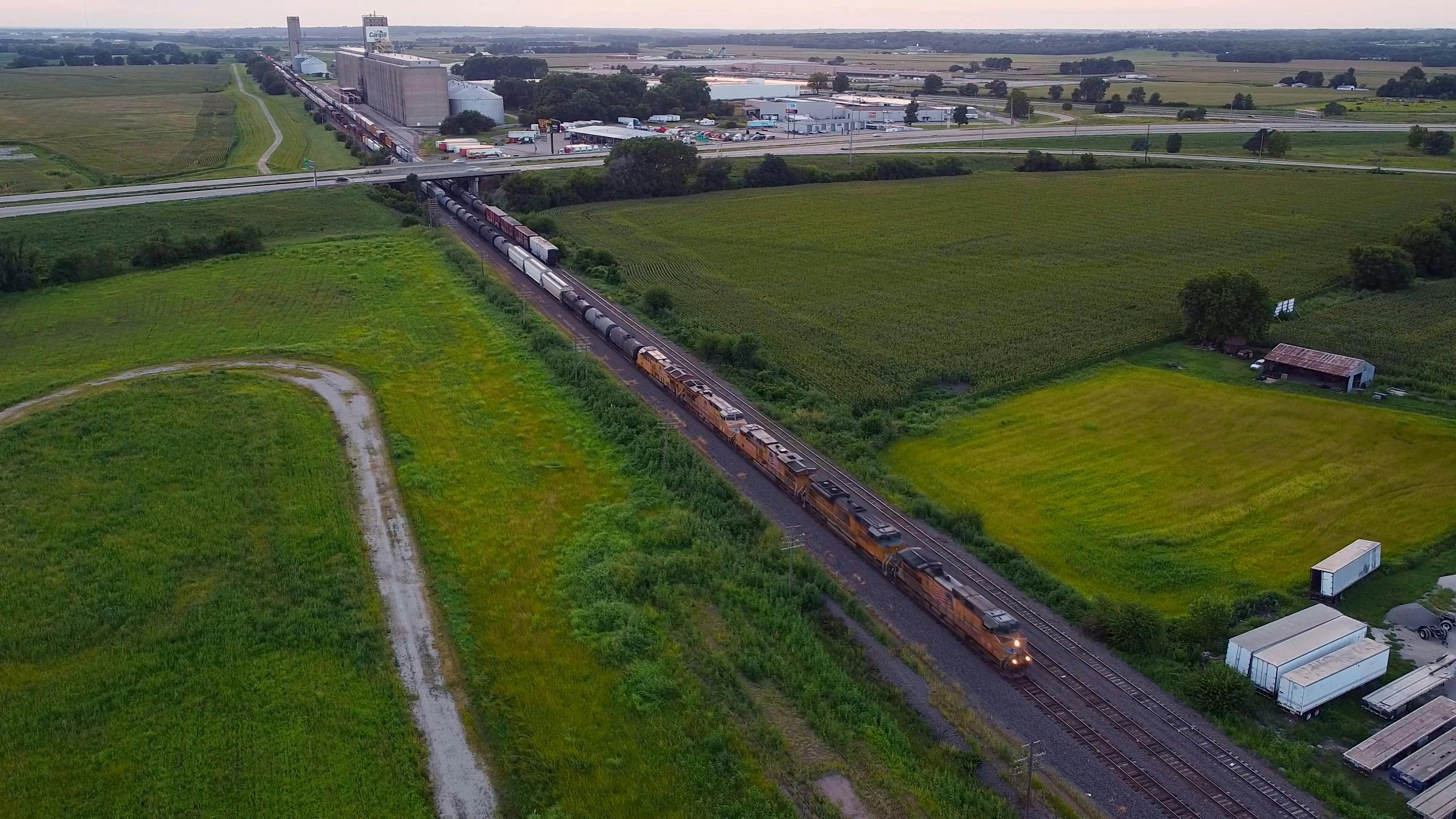 Drone Footage of Moving Train on Railroad Tracks · Free Stock Video