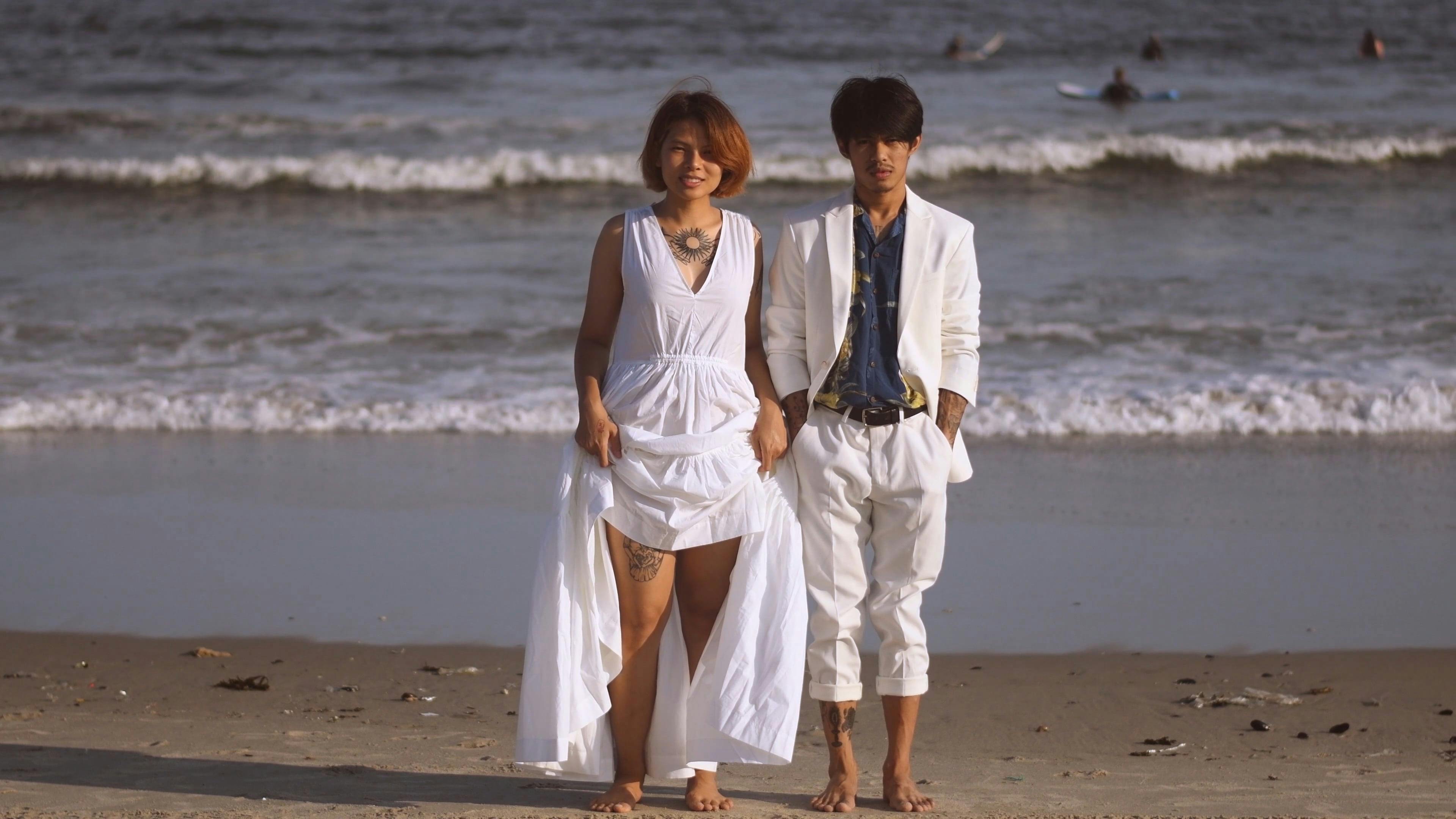 Couple Posing for Photographer at Beach Free Stock Video Footage ...