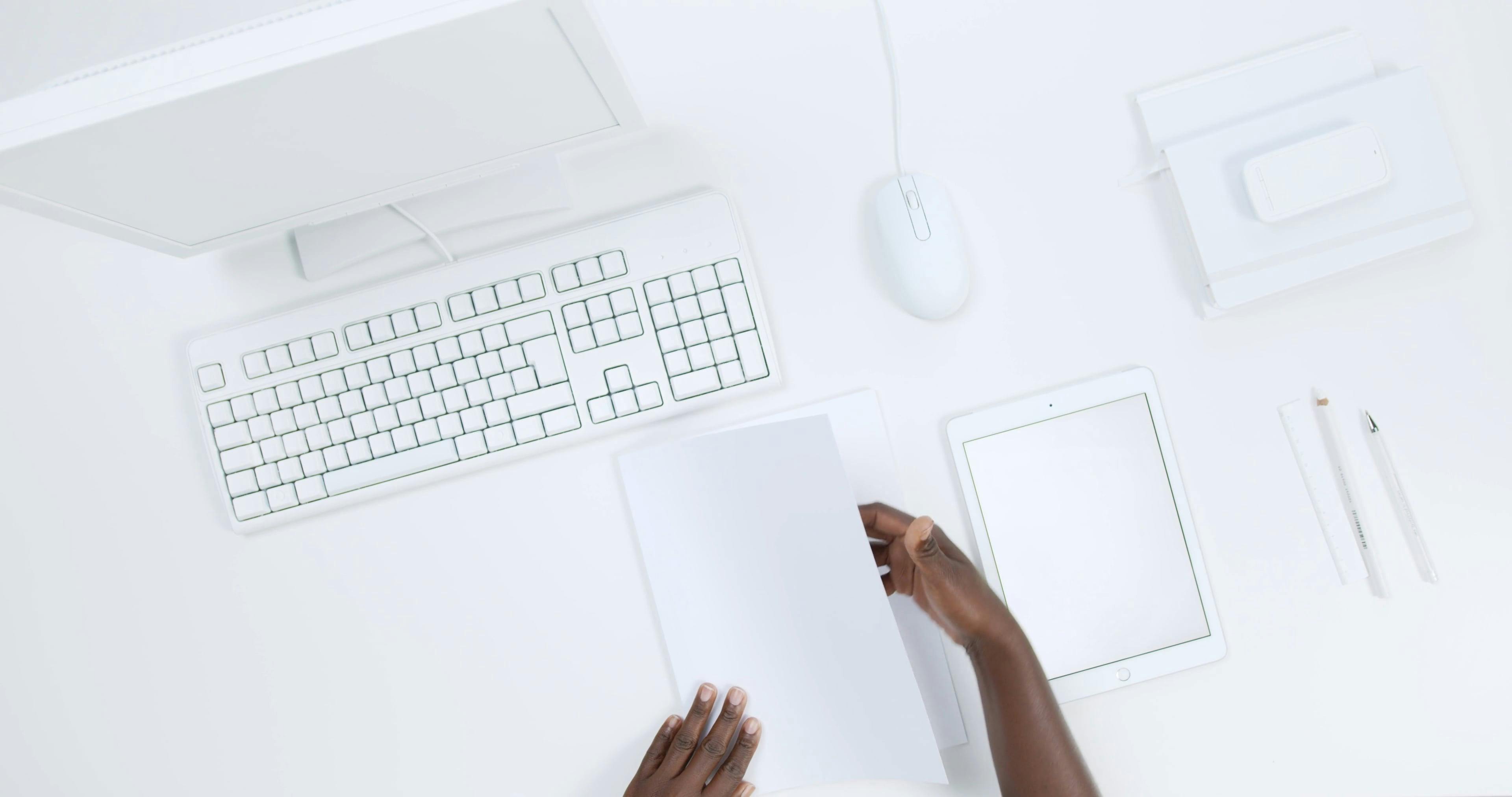 Computer Keyboard and Camera on Top of Desk · Free Stock Video