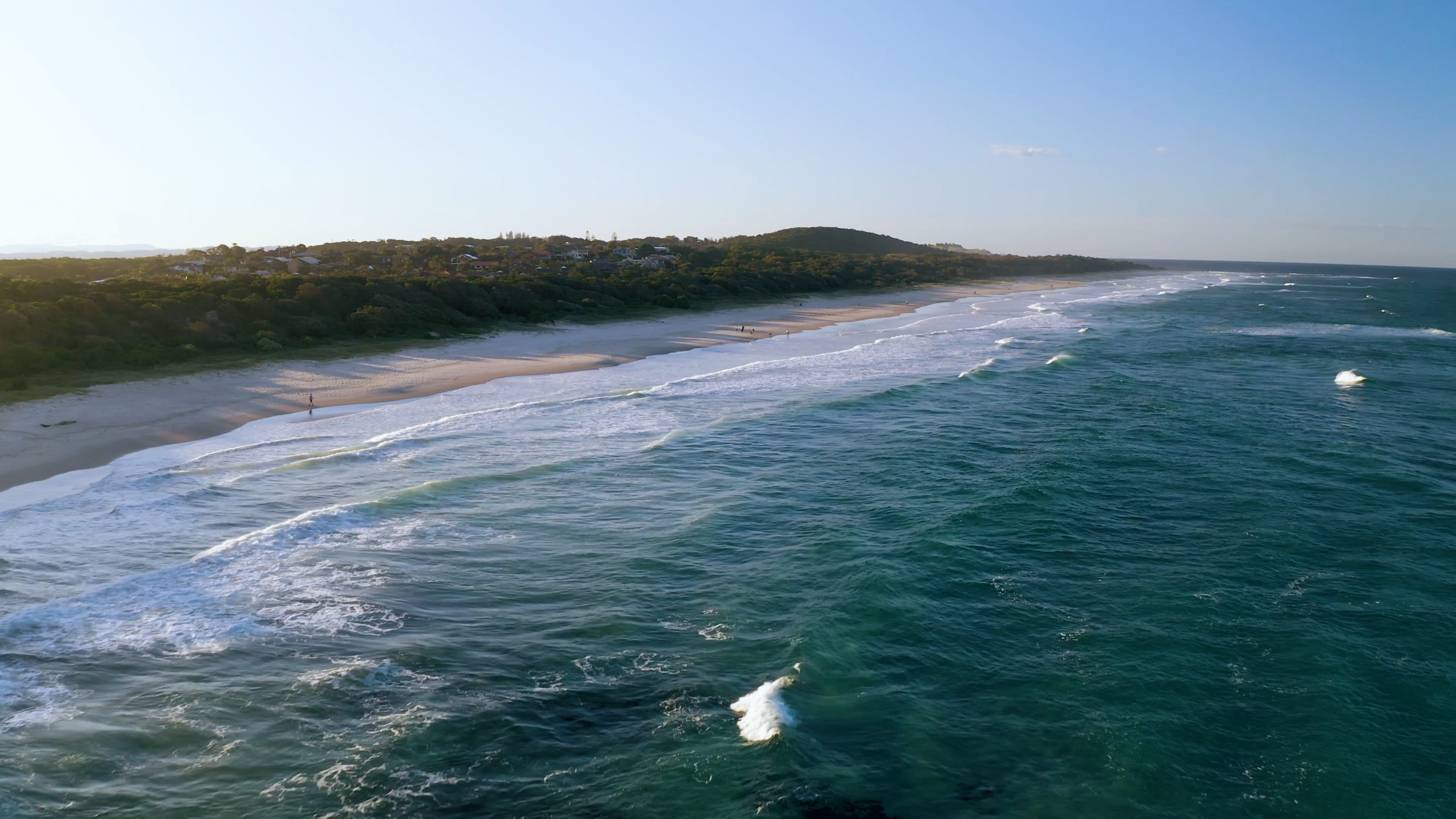 Series Of Waves Kissing The Beach Shoreline · Free Stock Video