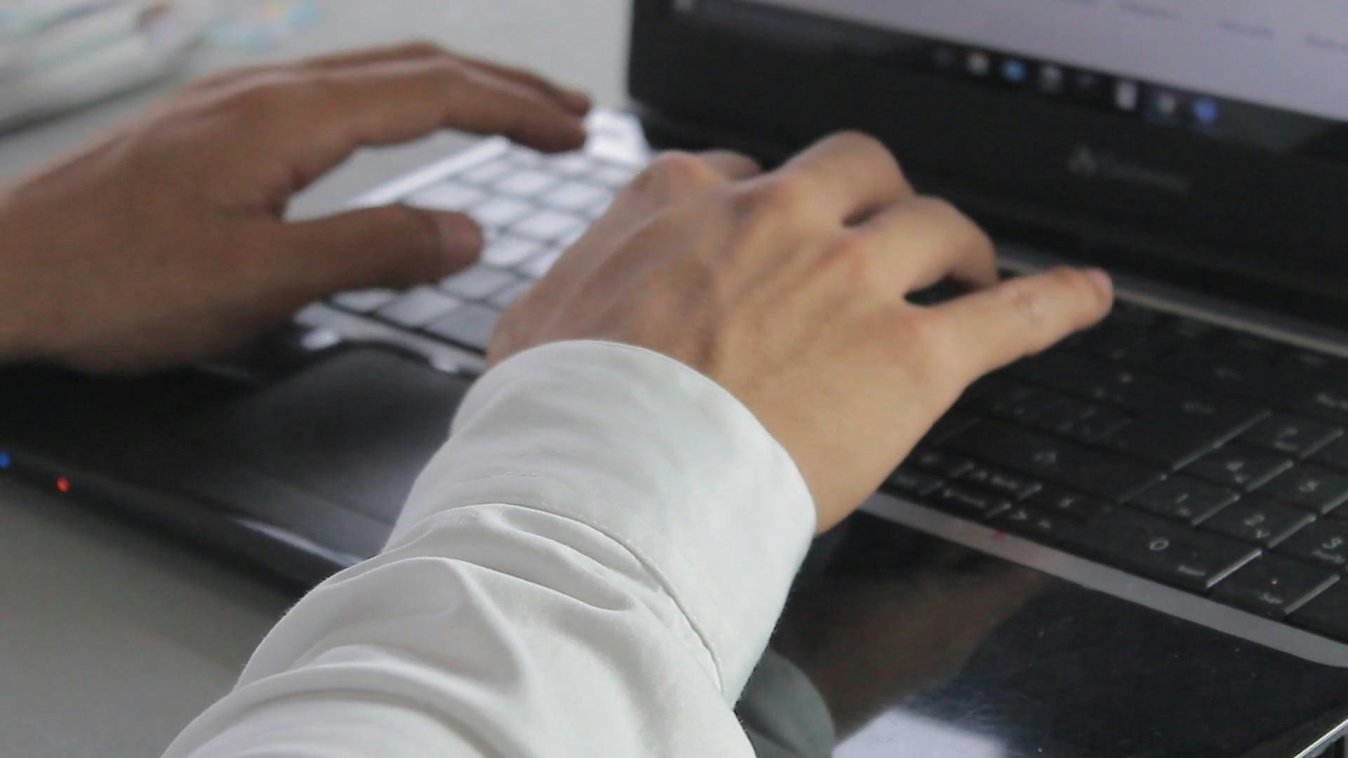 Person using Keyboard while Typing · Free Stock Video