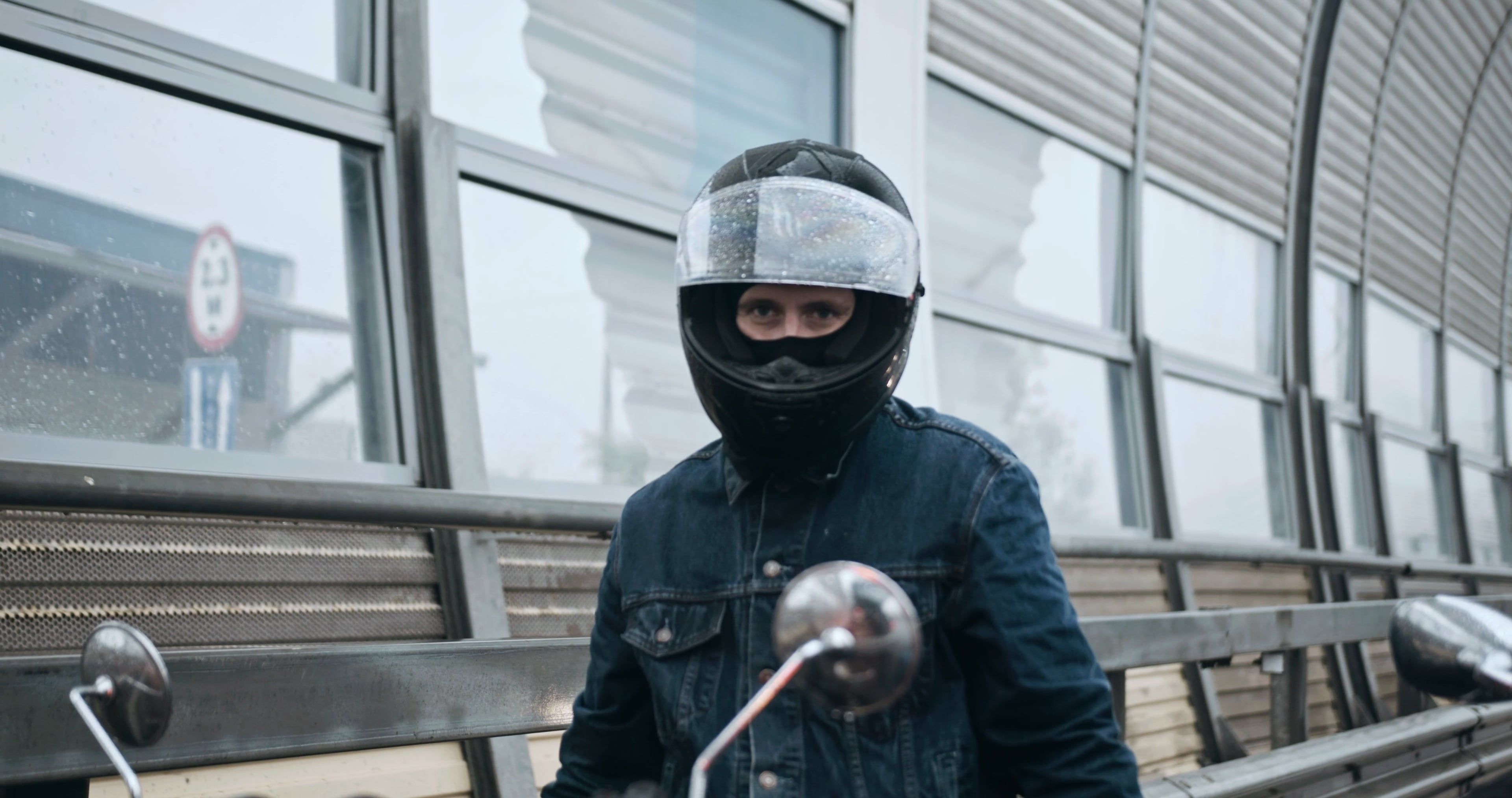 Man Wearing a Helmet Riding a Motorcycle · Free Stock Video