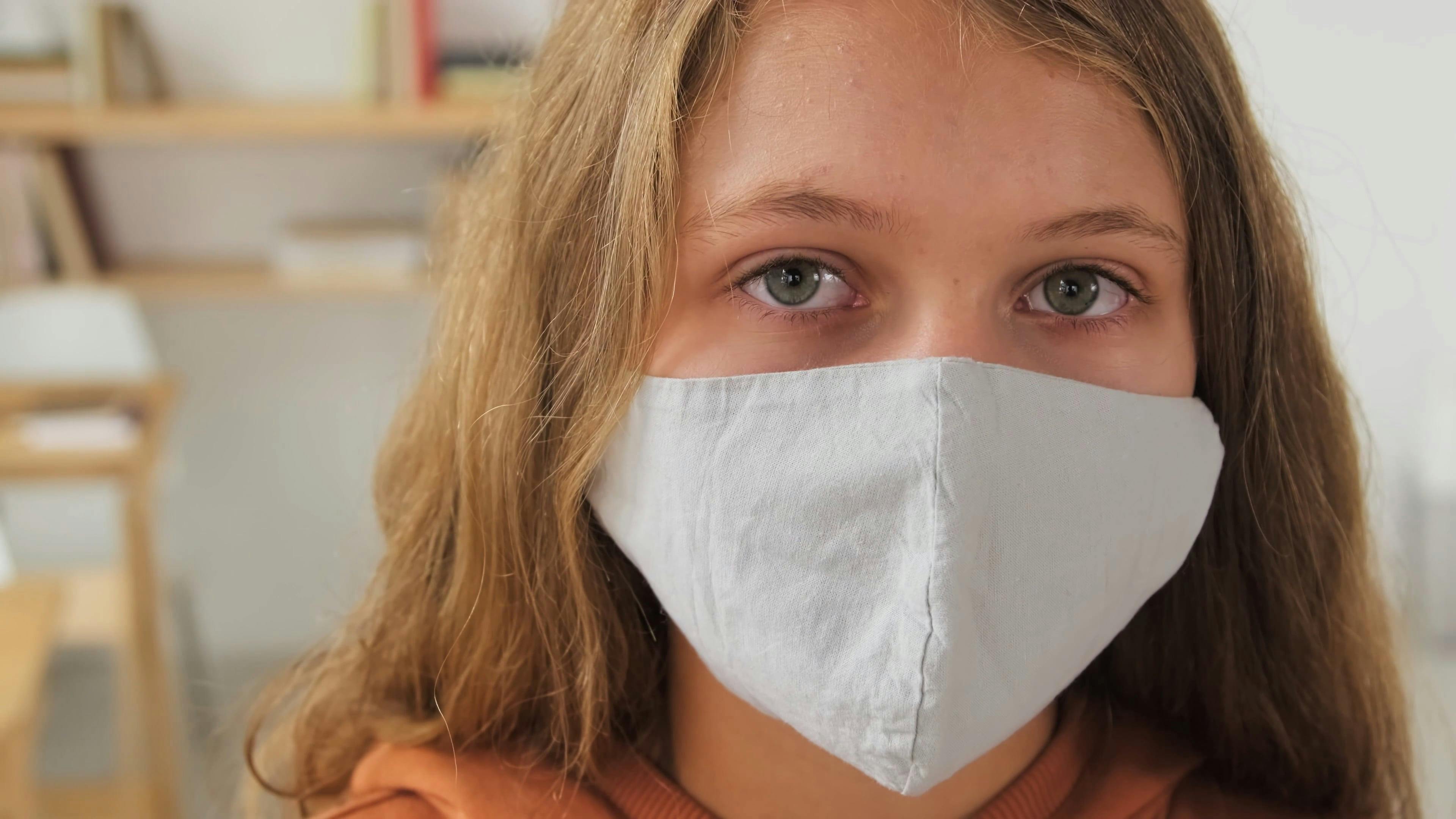 A Young Girl Student Wearing Face mask In School · Free Stock Video