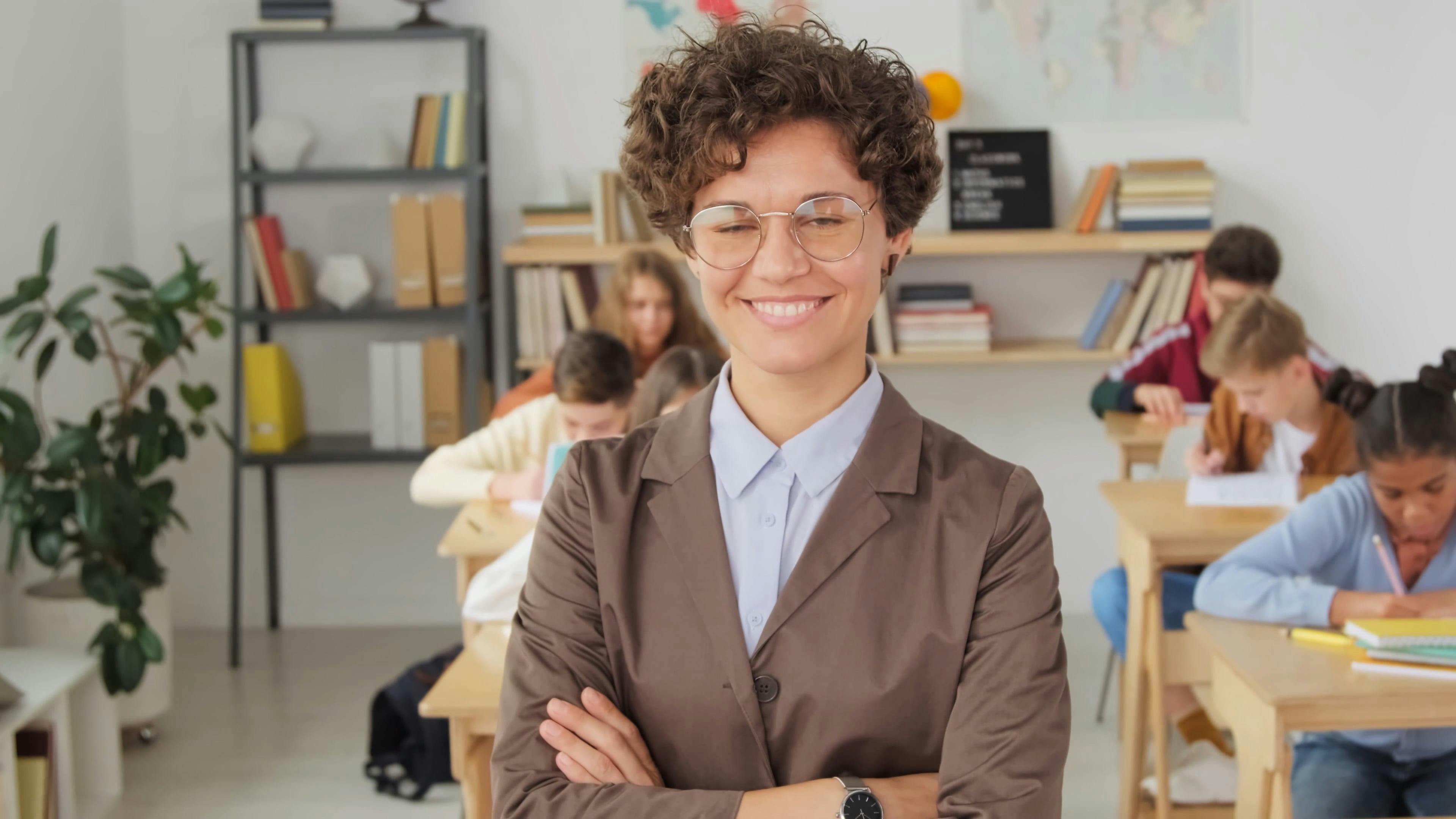 A Female Educator Smiling For The Camera Free Stock Video Footage ...
