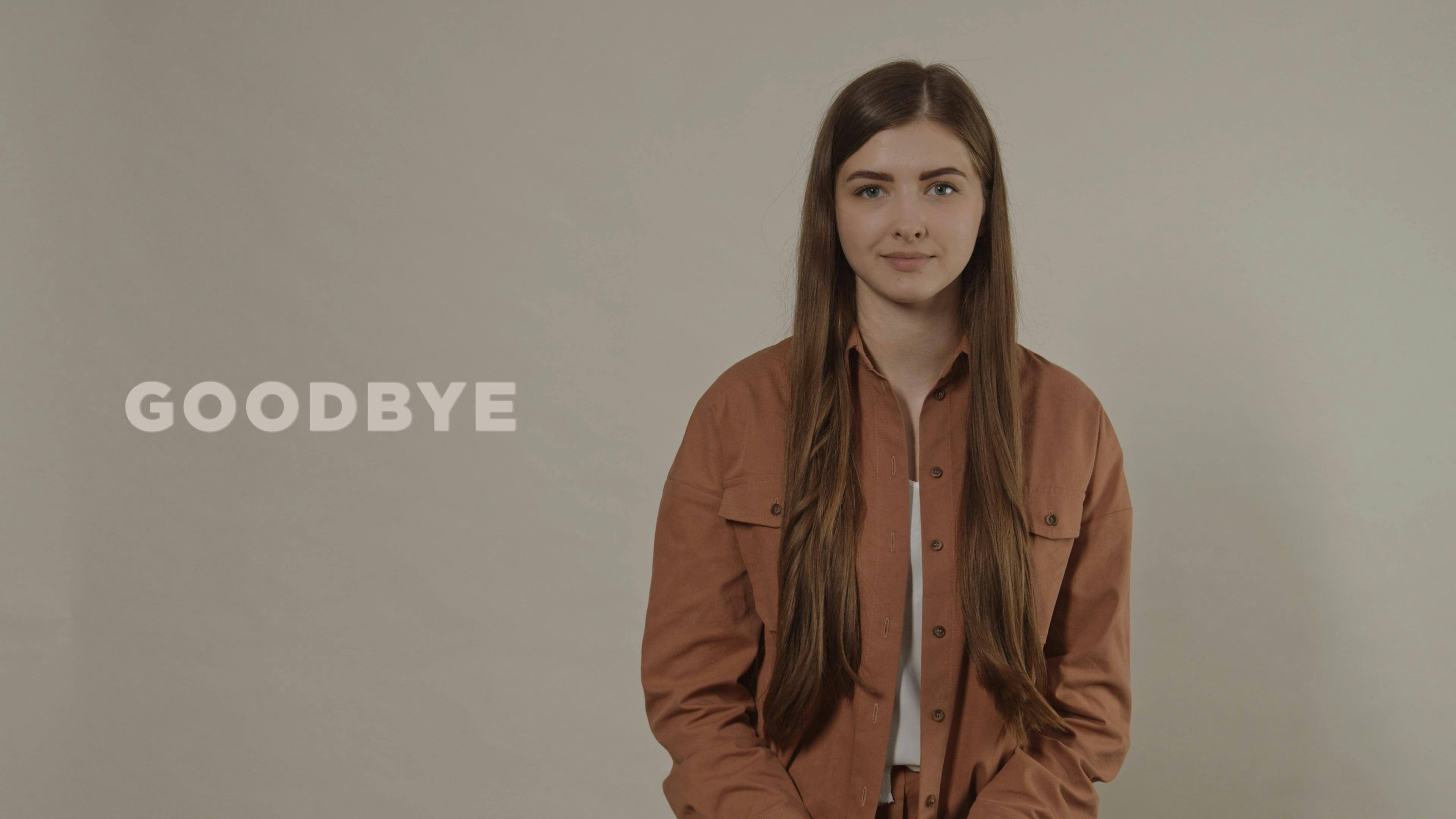 Woman Saying Goodbye by Doing a Sign Language · Free Stock Video