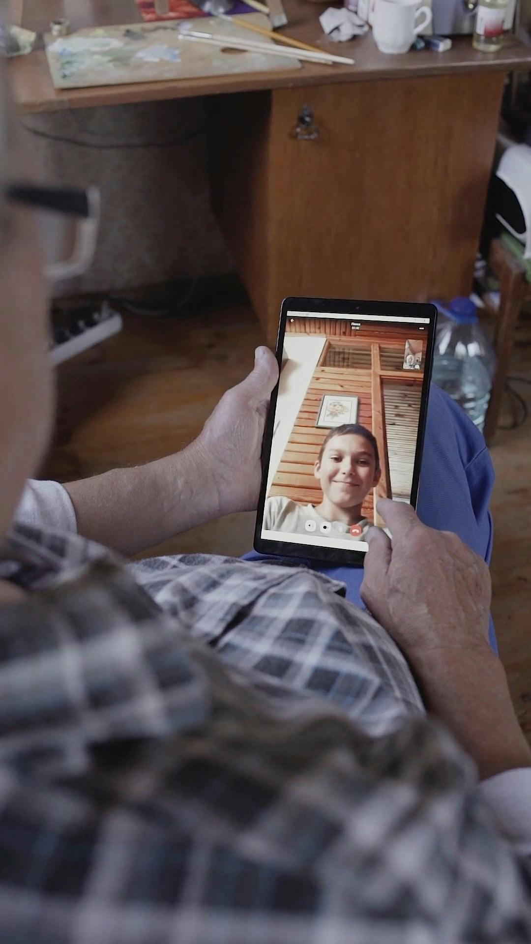Man Having a FaceTime with his Grandson · Free Stock Video