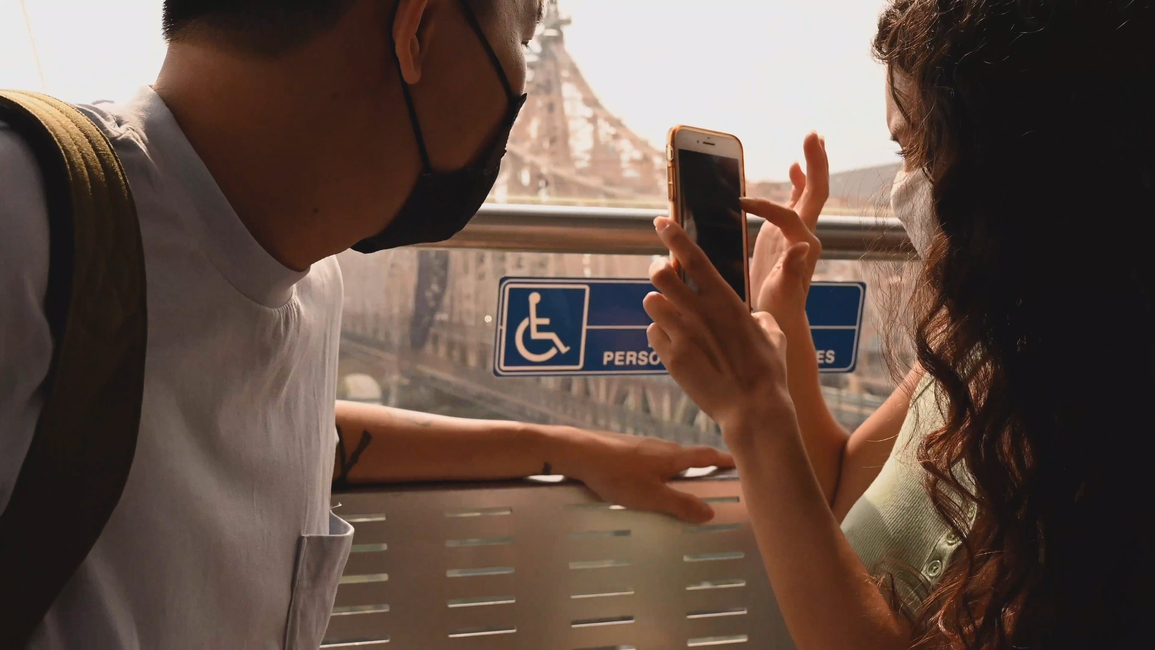 Couple Recording a Video while Riding in a Cable Car · Free Stock Video