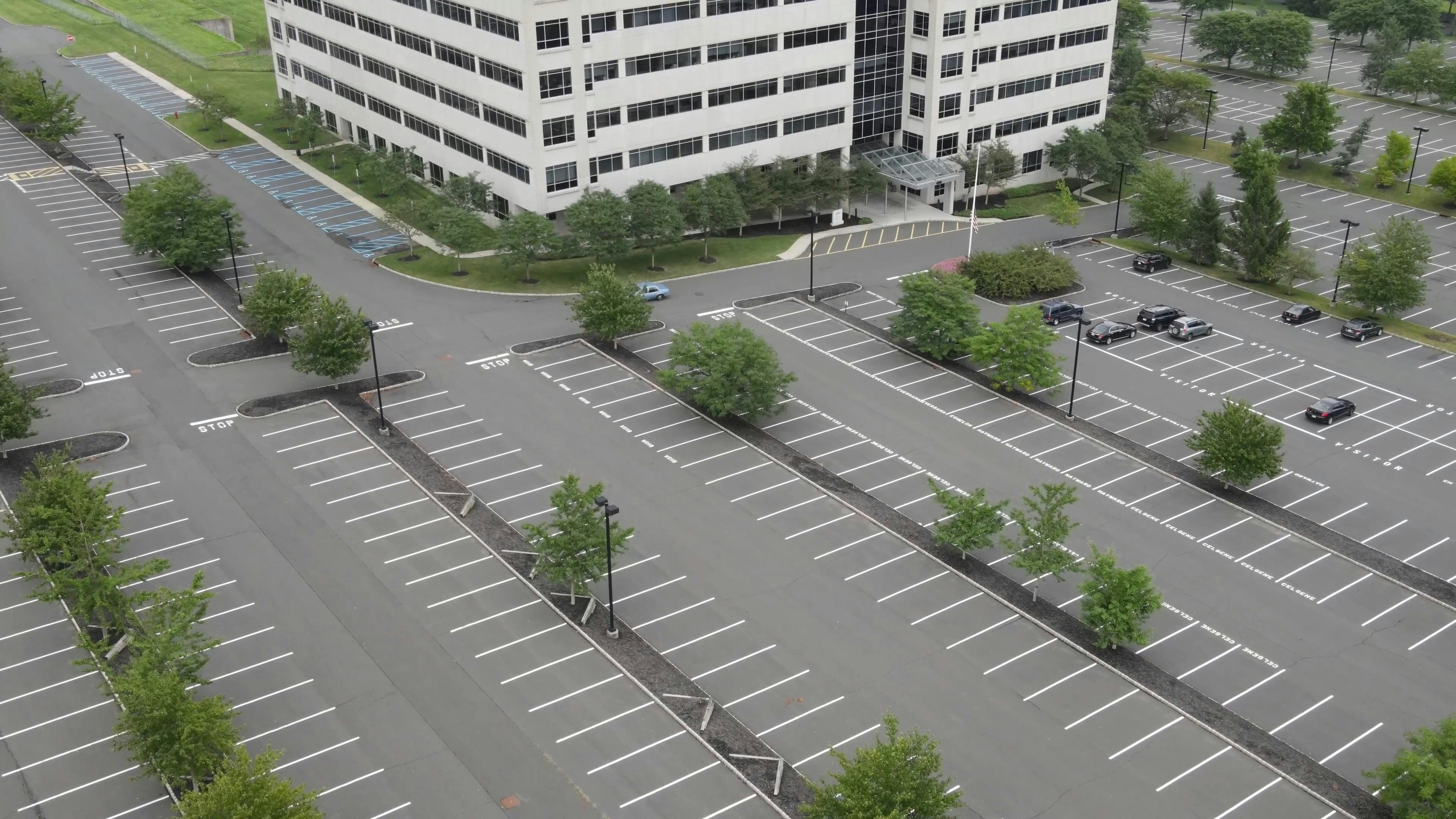 Overview Of A Building And Its Parking Area Free Stock Video Footage ...