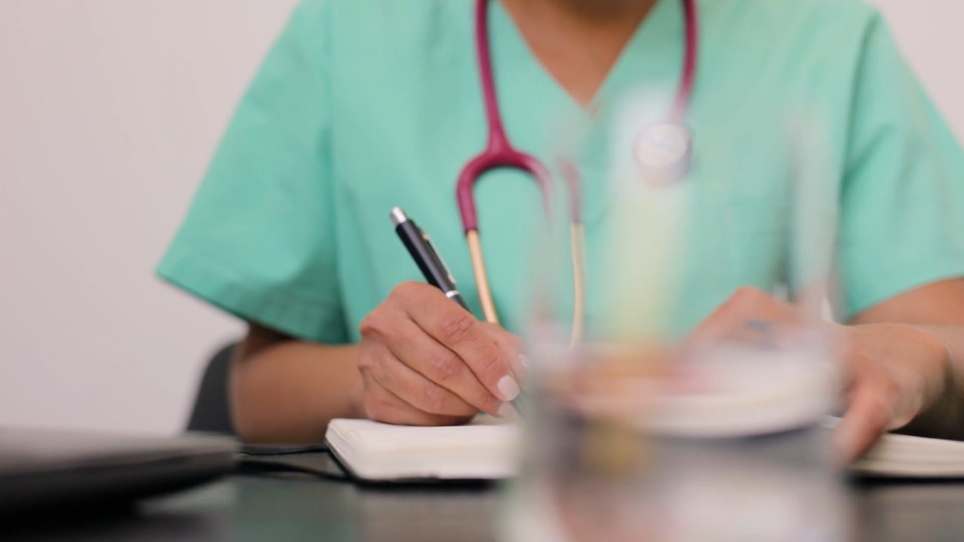 A Doctor Writing on the Paper Free Stock Video Footage, Royalty-Free 4K ...