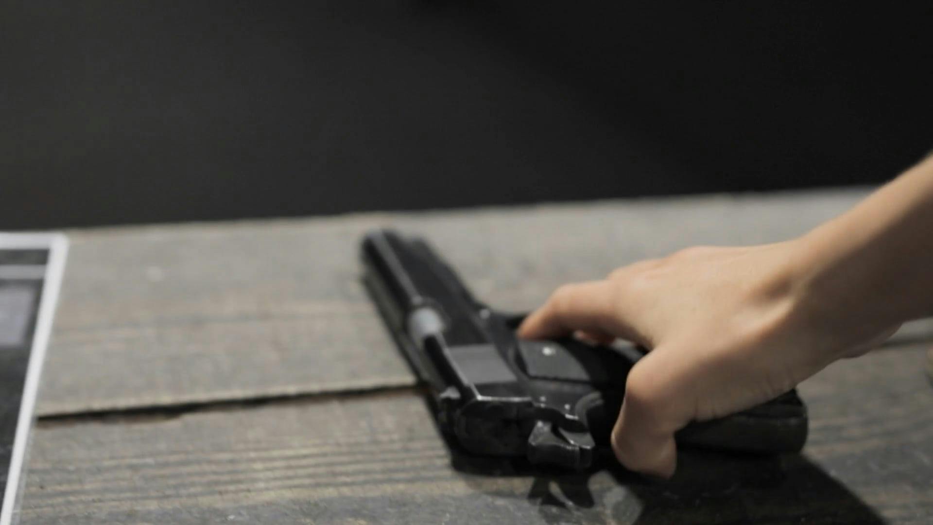 A Woman Loading a Gun Free Stock Video Footage, Royalty-Free 4K & HD ...