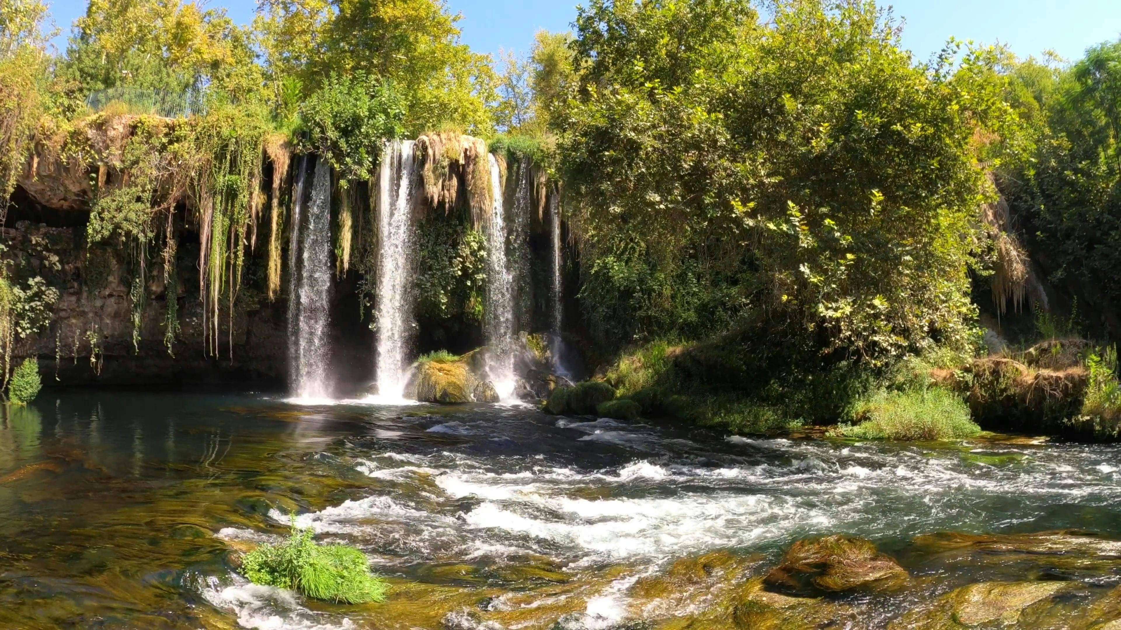 Beautiful Scenery of a Flowing Waterfalls · Free Stock Video
