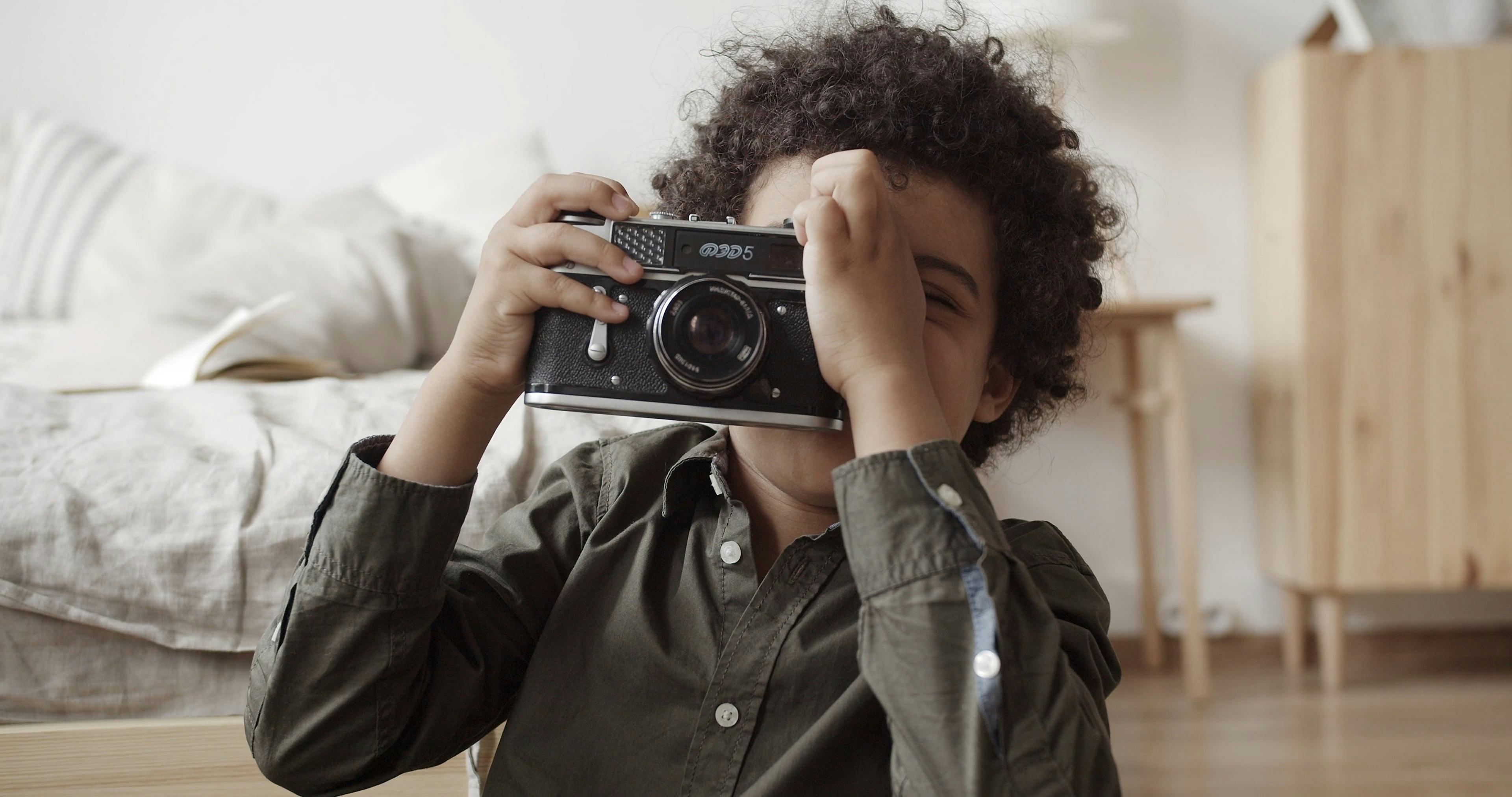 A Child Taking Photos · Free Stock Video