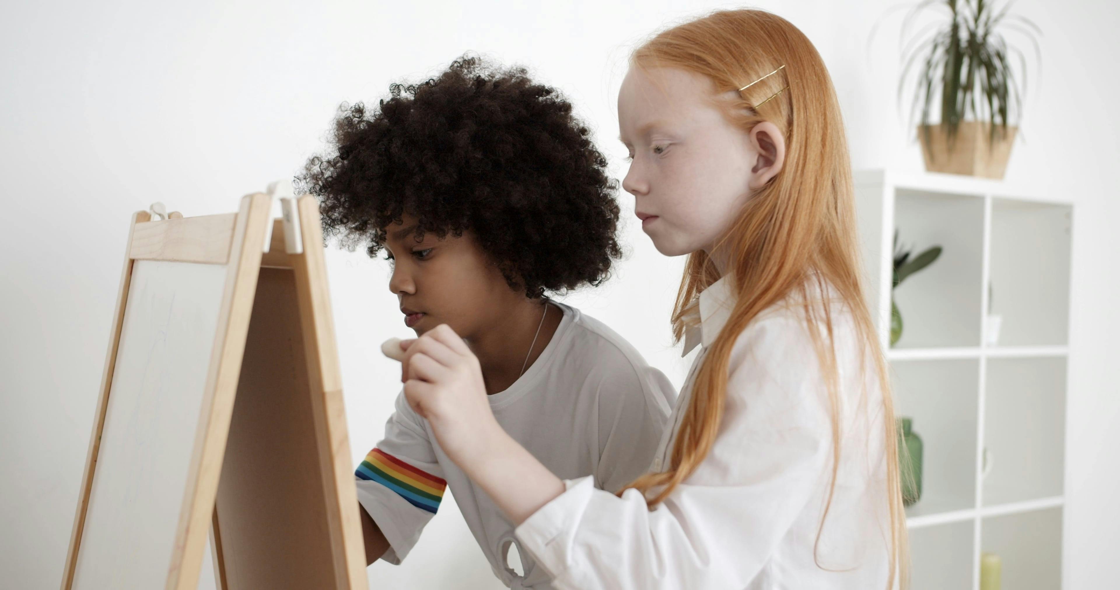 Two Kids Writing on a Board Free Stock Video Footage, Royalty-Free 4K ...