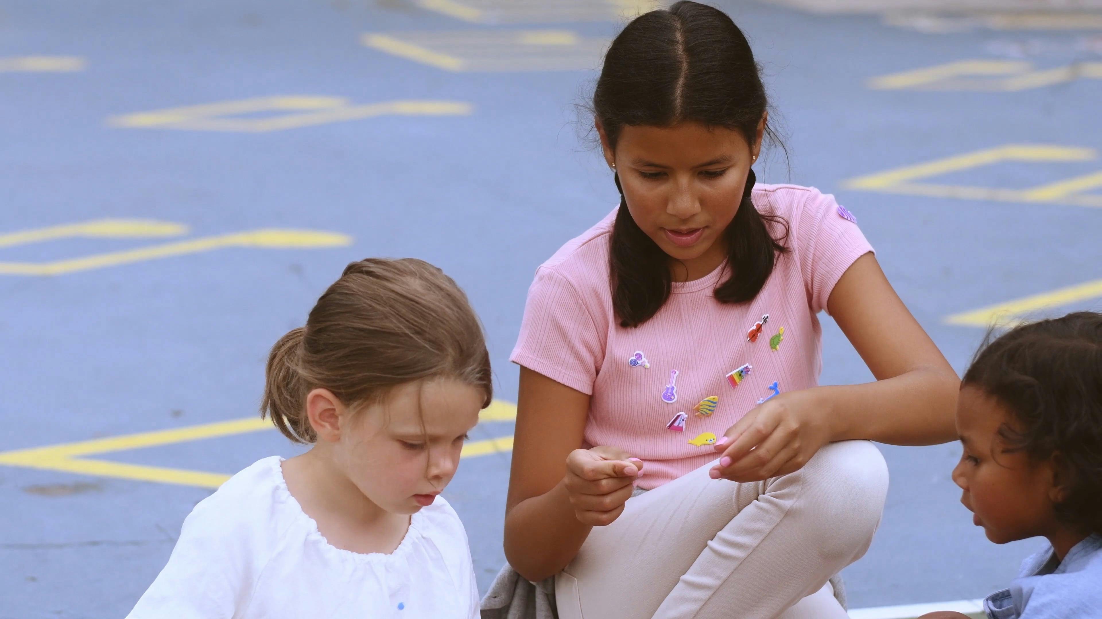 Three Girls Putting Stickers on their Clothes Free Stock Video Footage ...