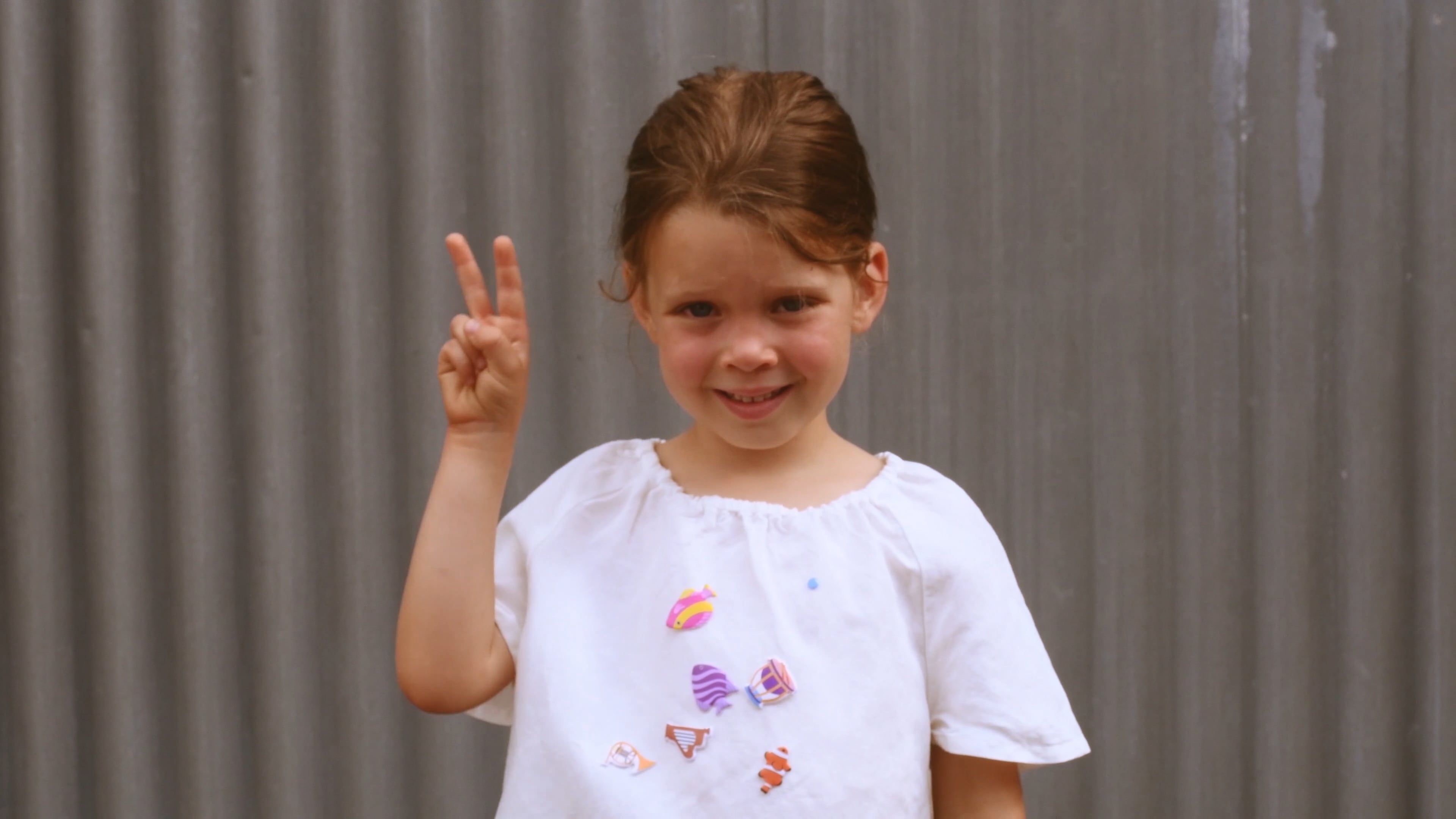 A Cute Girl Doing Peace Signs Free Stock Video Footage, Royalty-Free 4K ...