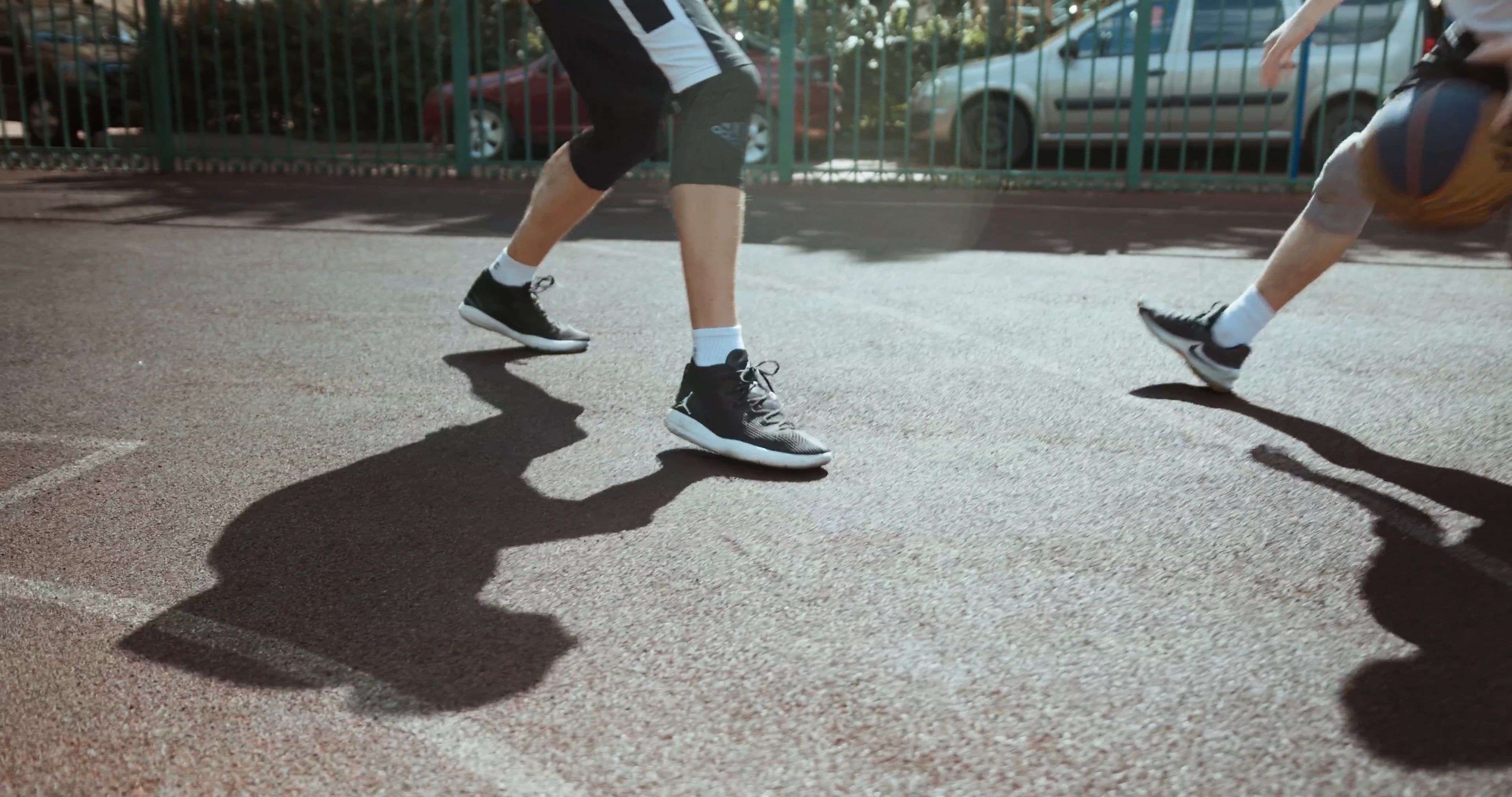 Player Dribbling and Passing the Basketball to his Team Member Free ...