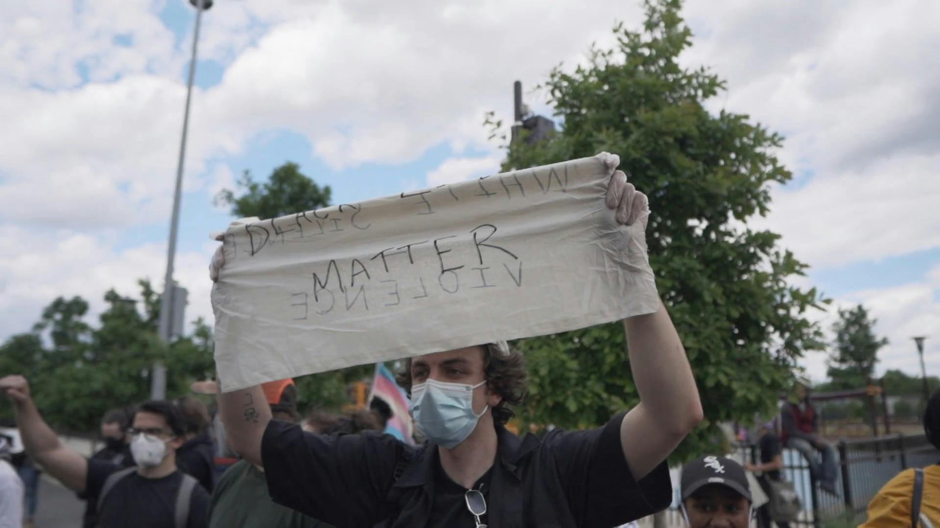 Man Standing with Black Lives Matter Slogan to Support Protest · Free ...