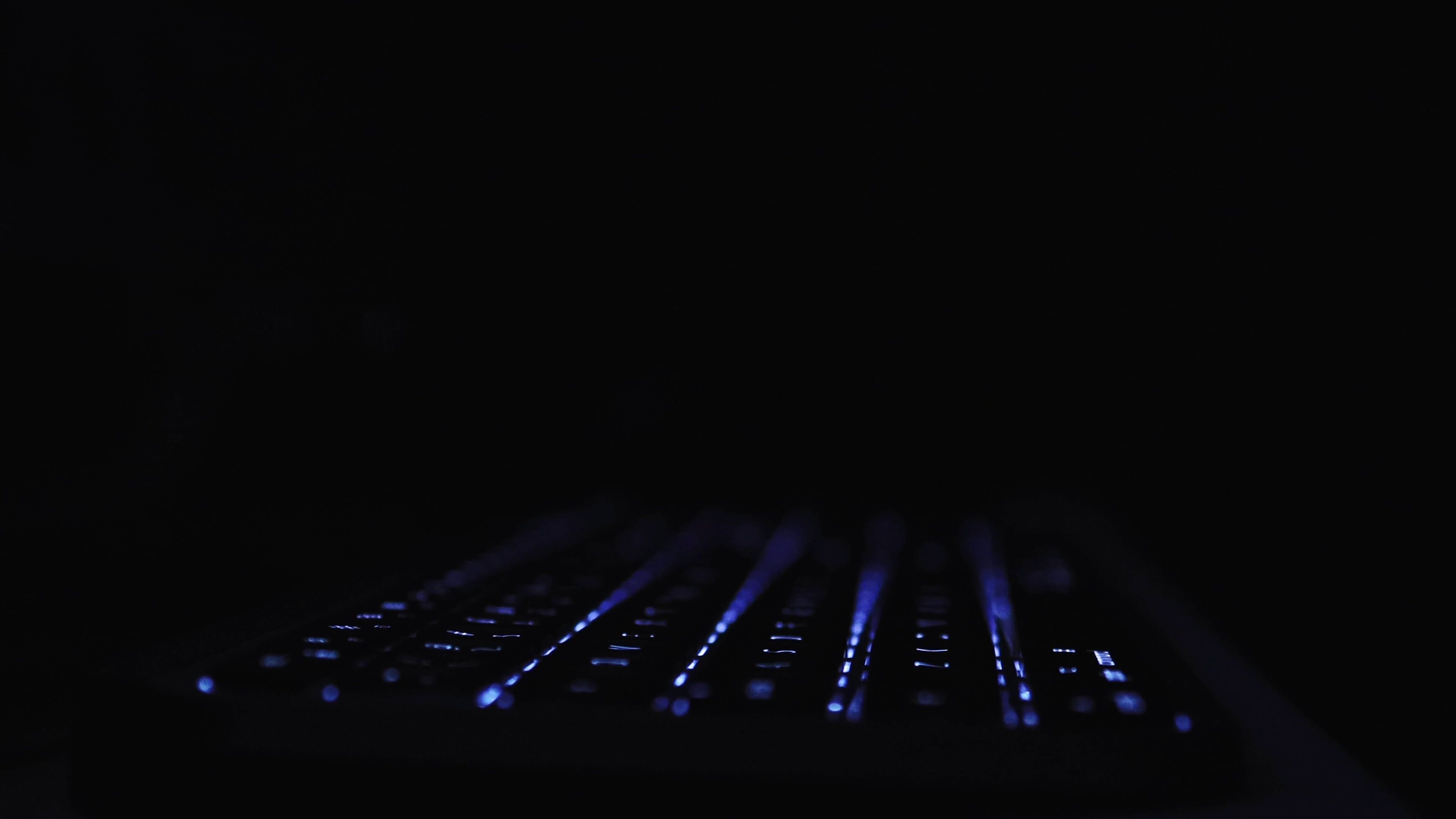 A Person Typing on a Keyboard in the Dark Free Stock Video Footage ...