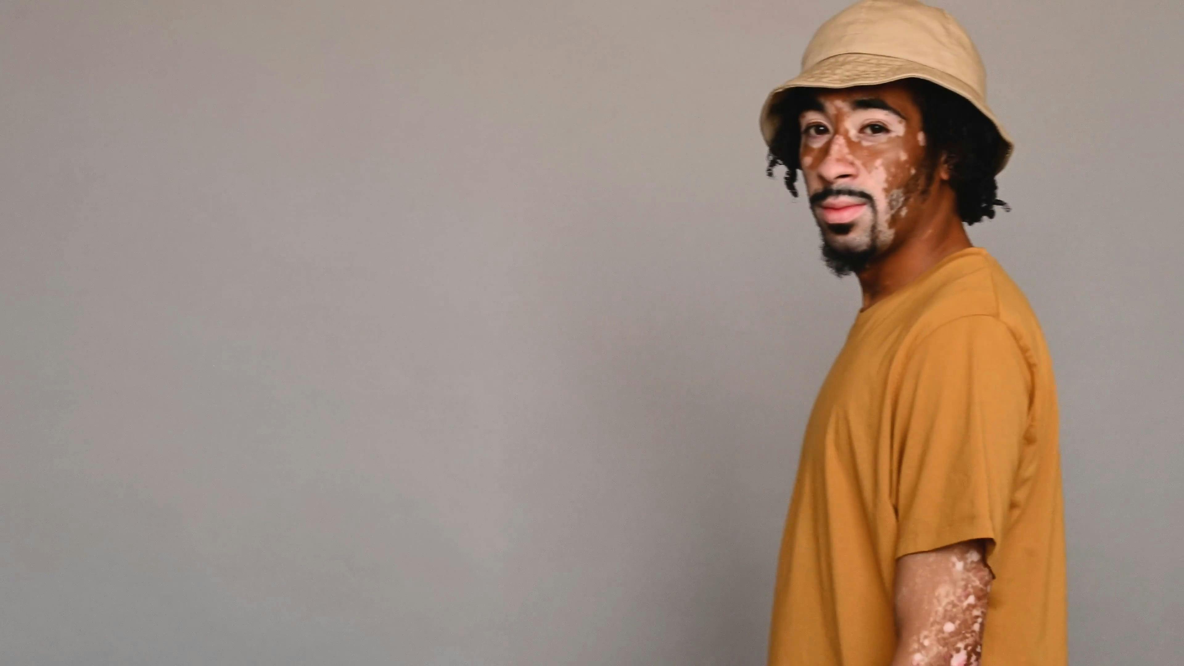 A Man Wearing a Bucket Hat · Free Stock Video