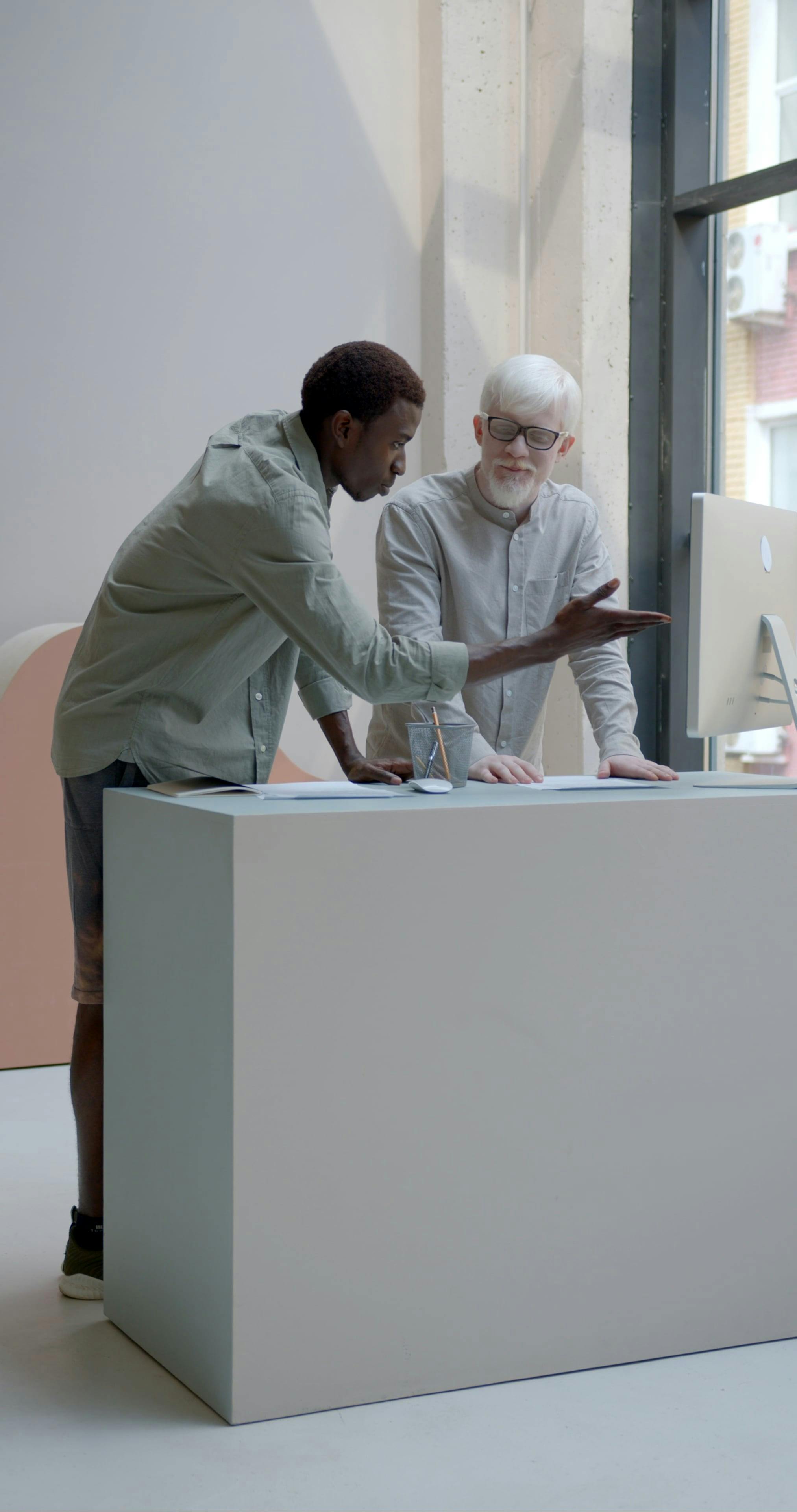 Two Men Discussing Things on a Desktop Free Stock Video Footage ...