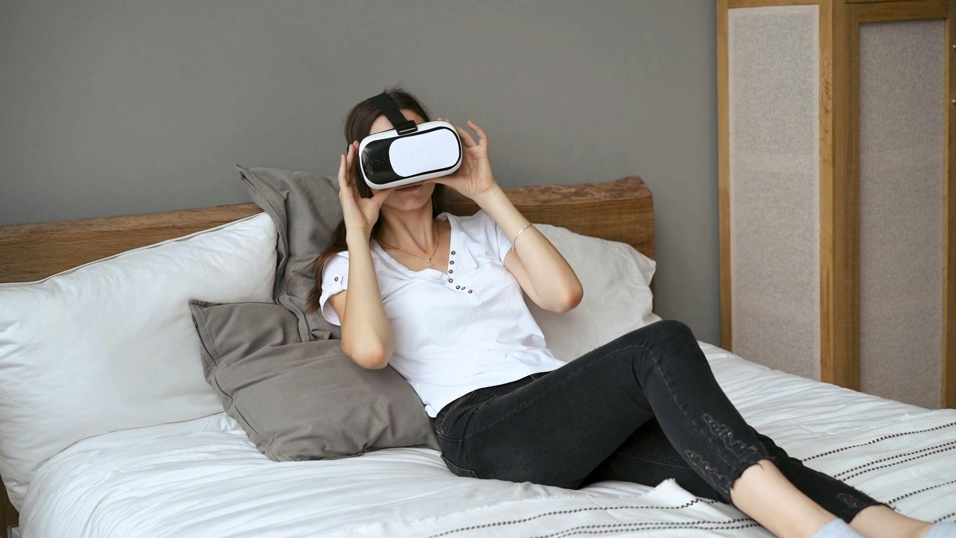 Woman Trying a Virtual Reality Box on the Bed Free Stock Video Footage ...