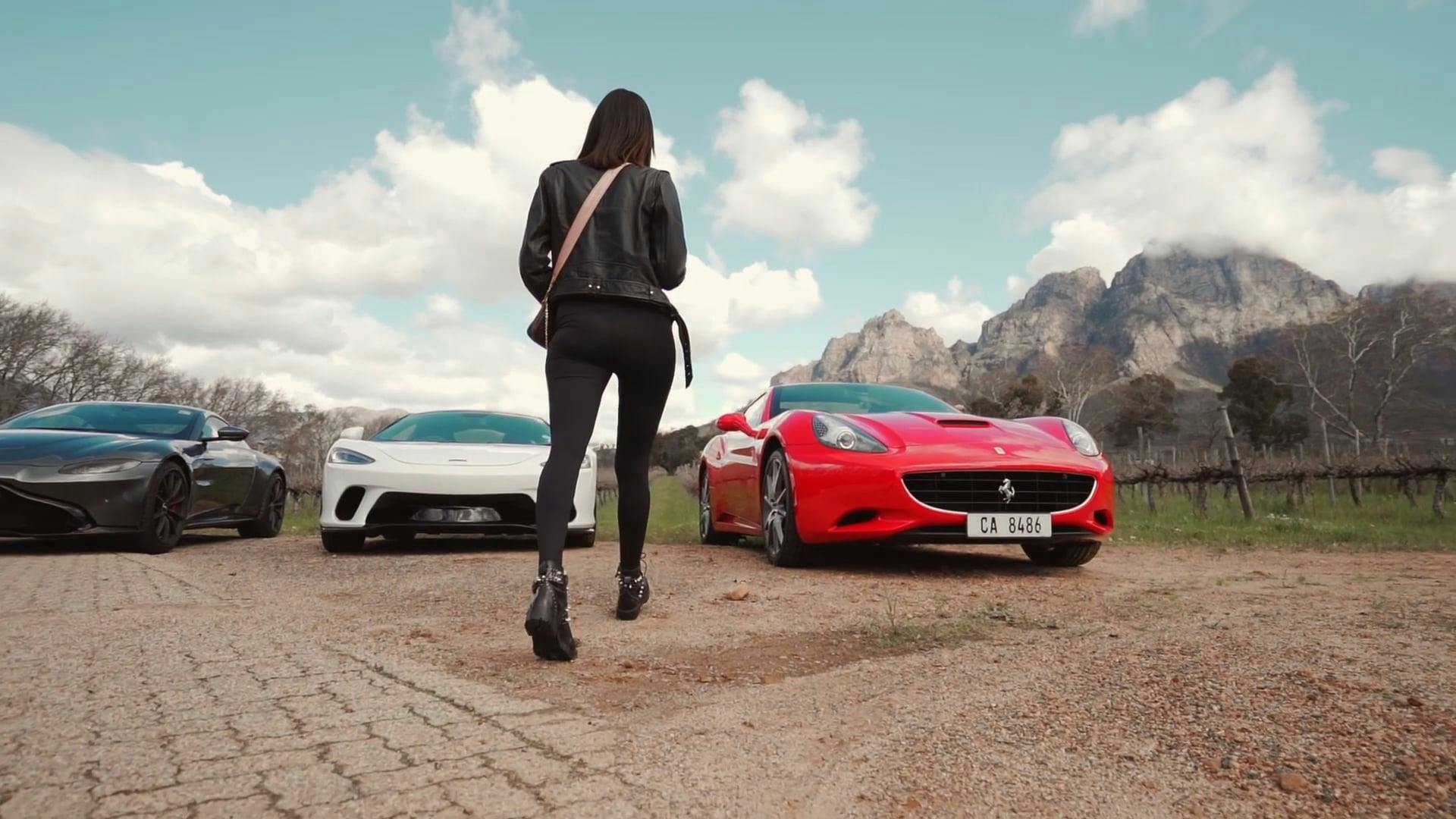 Woman Walking Towards a Luxury Sports Car · Free Stock Video