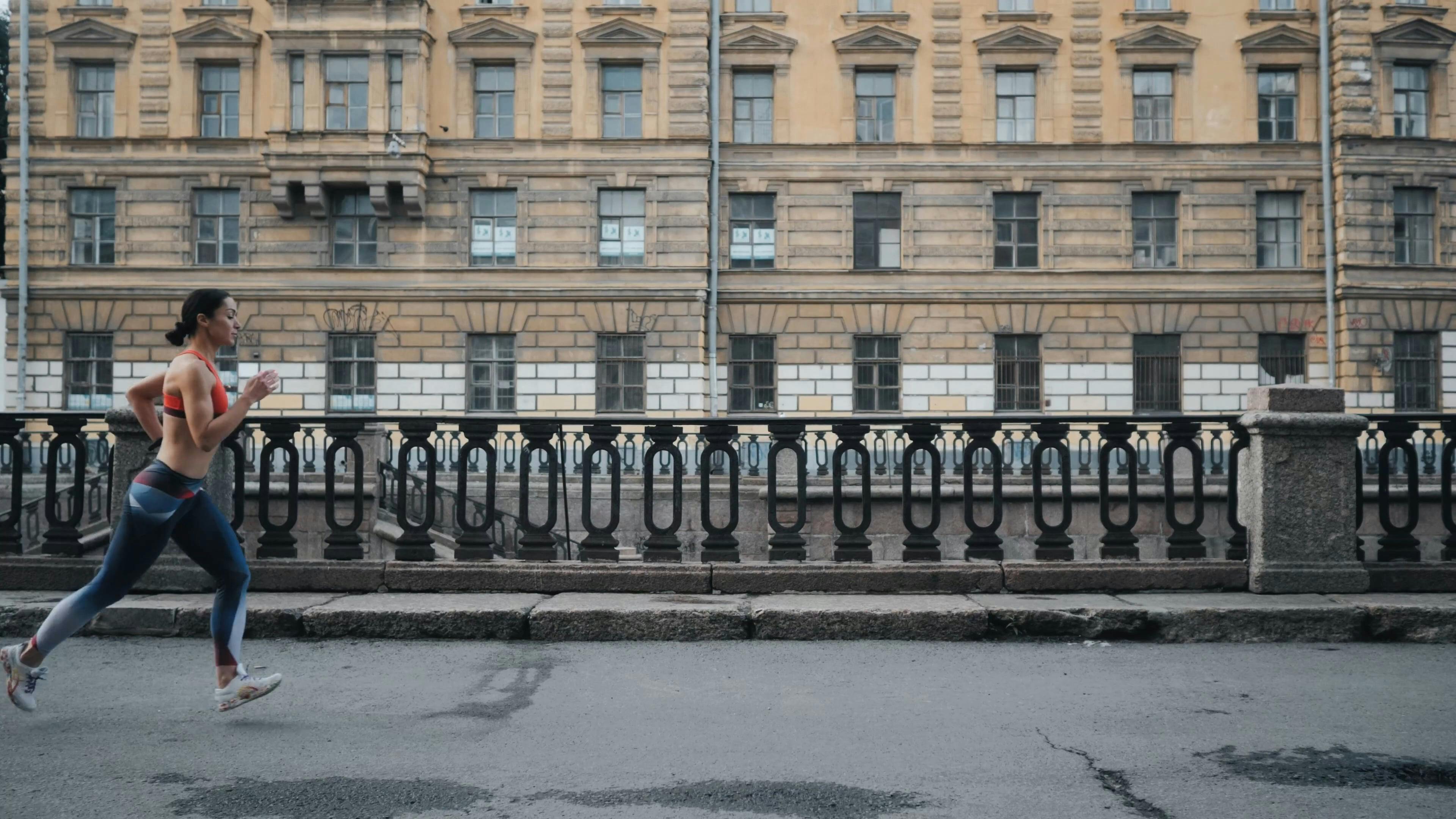 Woman Running on the Street · Free Stock Video
