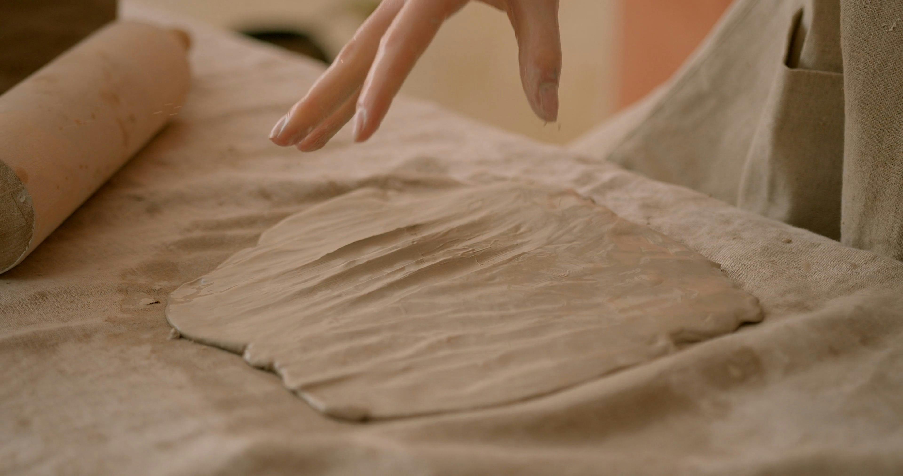 A Person Shaping Clay Using Water Free Stock Video Footage, Royalty ...