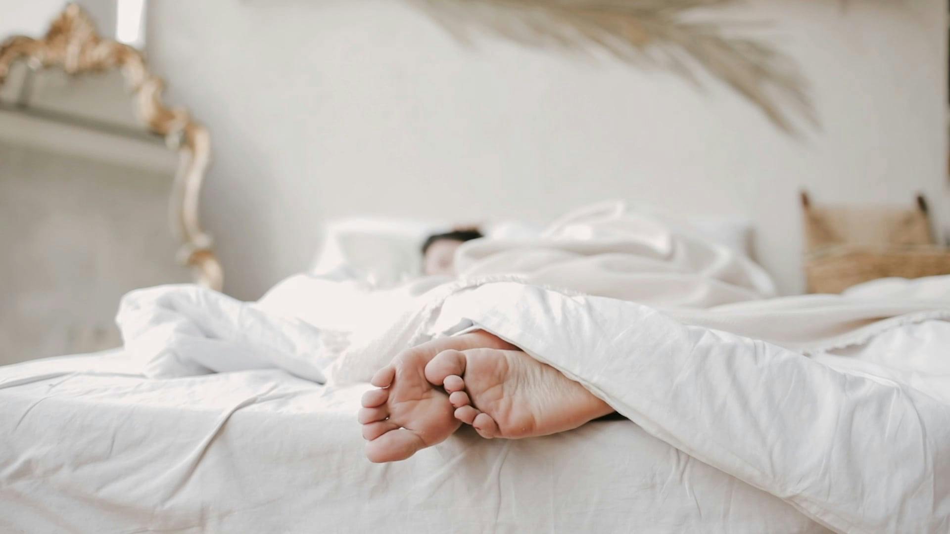 A Man Wrapping Himself in the Blanket and Falling Off Bed Free Stock ...