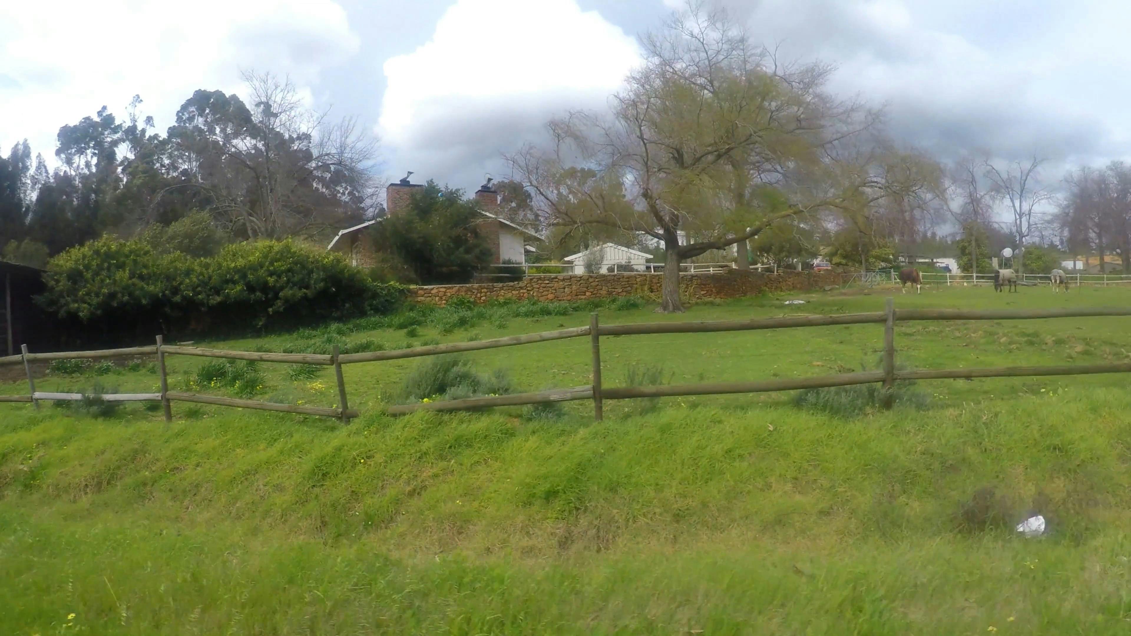 A Farm House Outside Of The Forest Overlooking The Field Free Stock ...