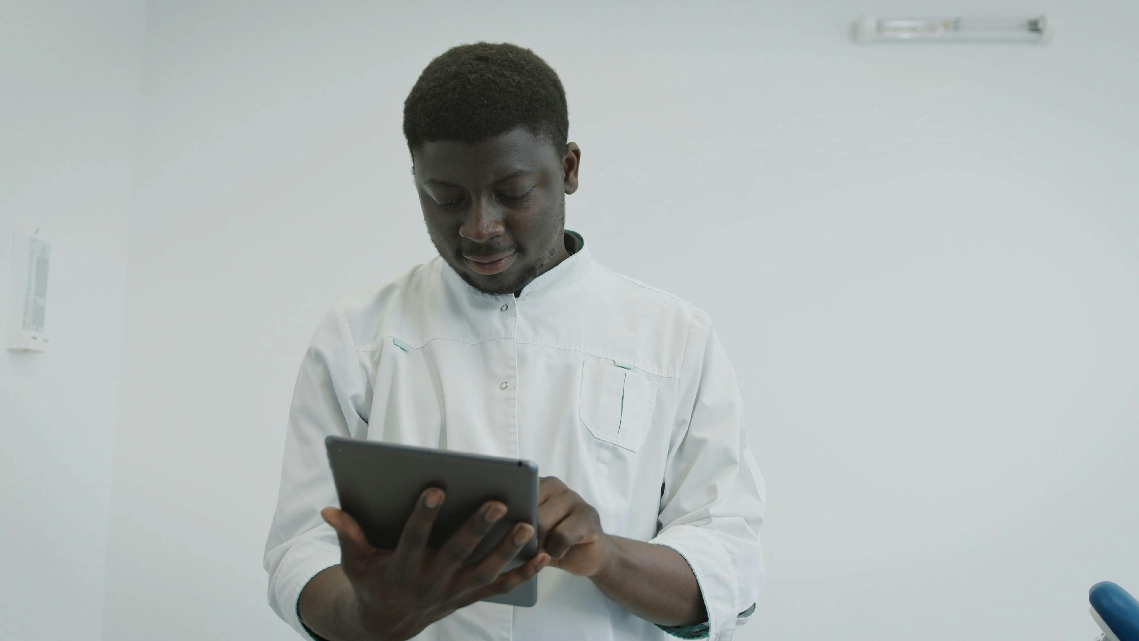 A Man Using a Tablet · Free Stock Video