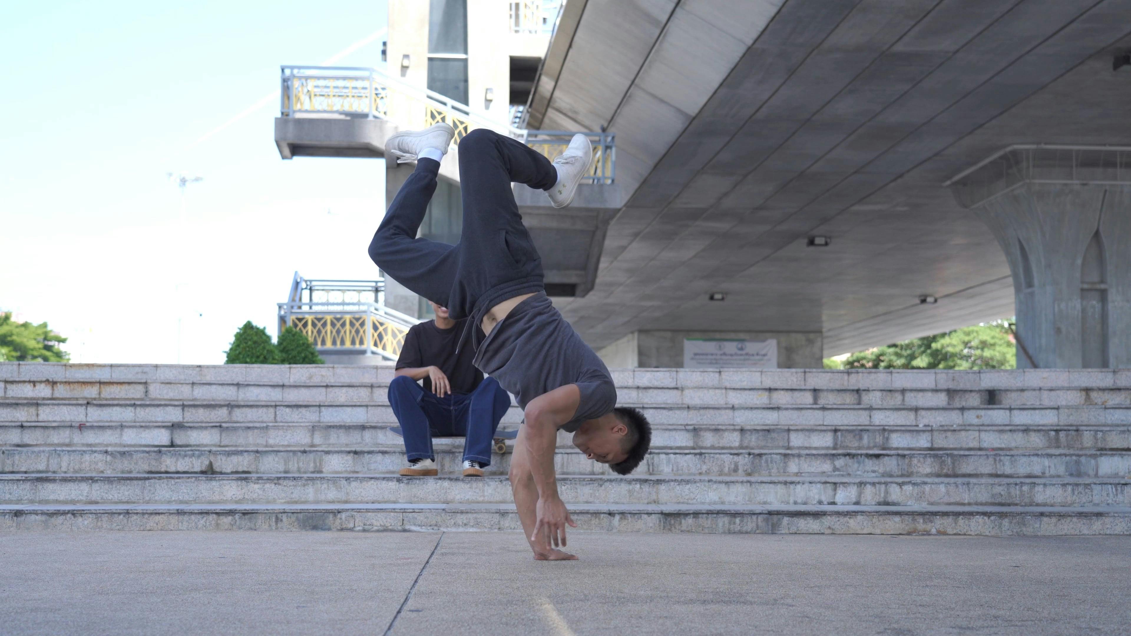 Man Helping Another Man Standing Up · Free Stock Video