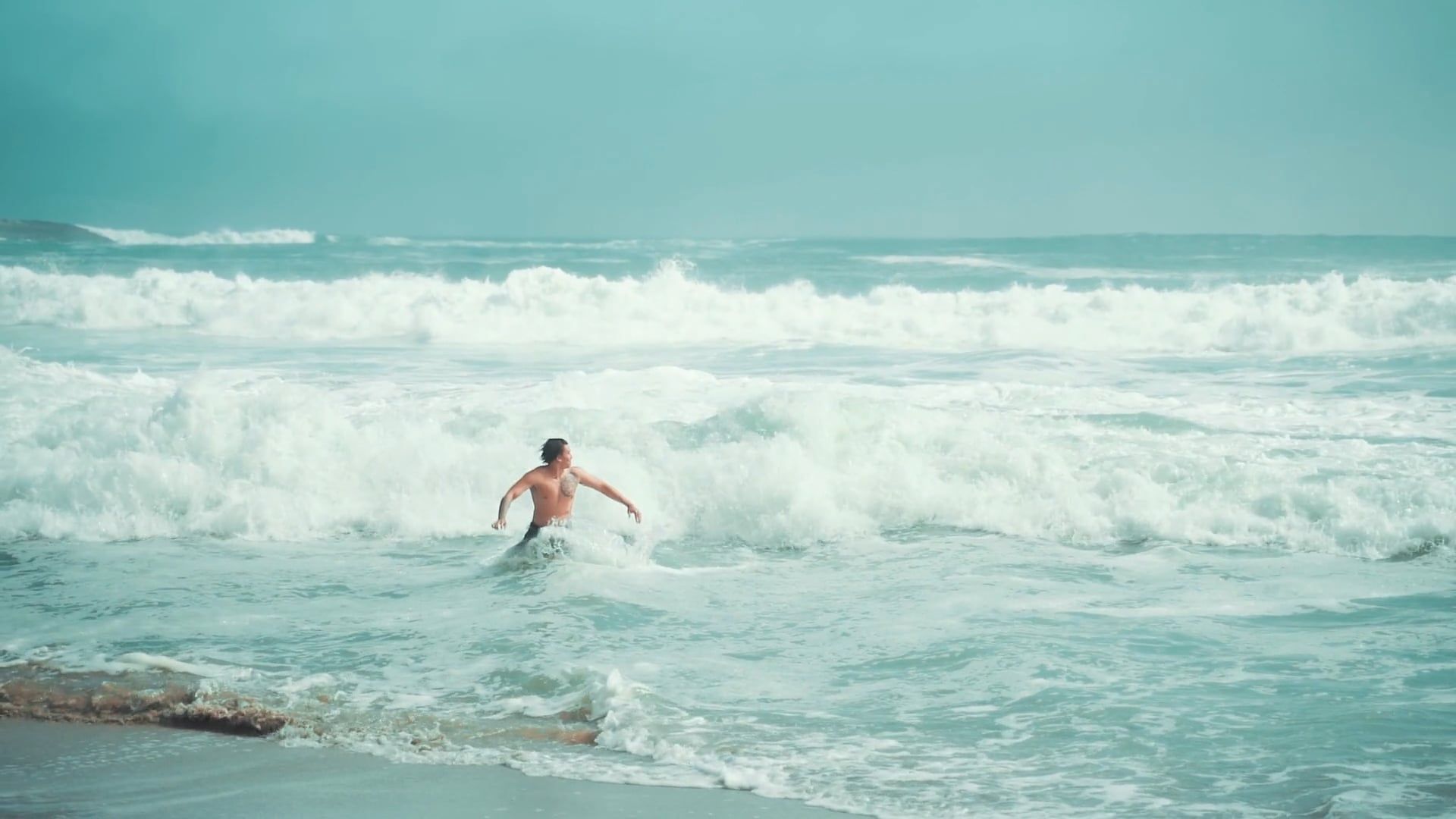 A Man Enjoying the Beach Waves Free Stock Video Footage, Royalty-Free ...