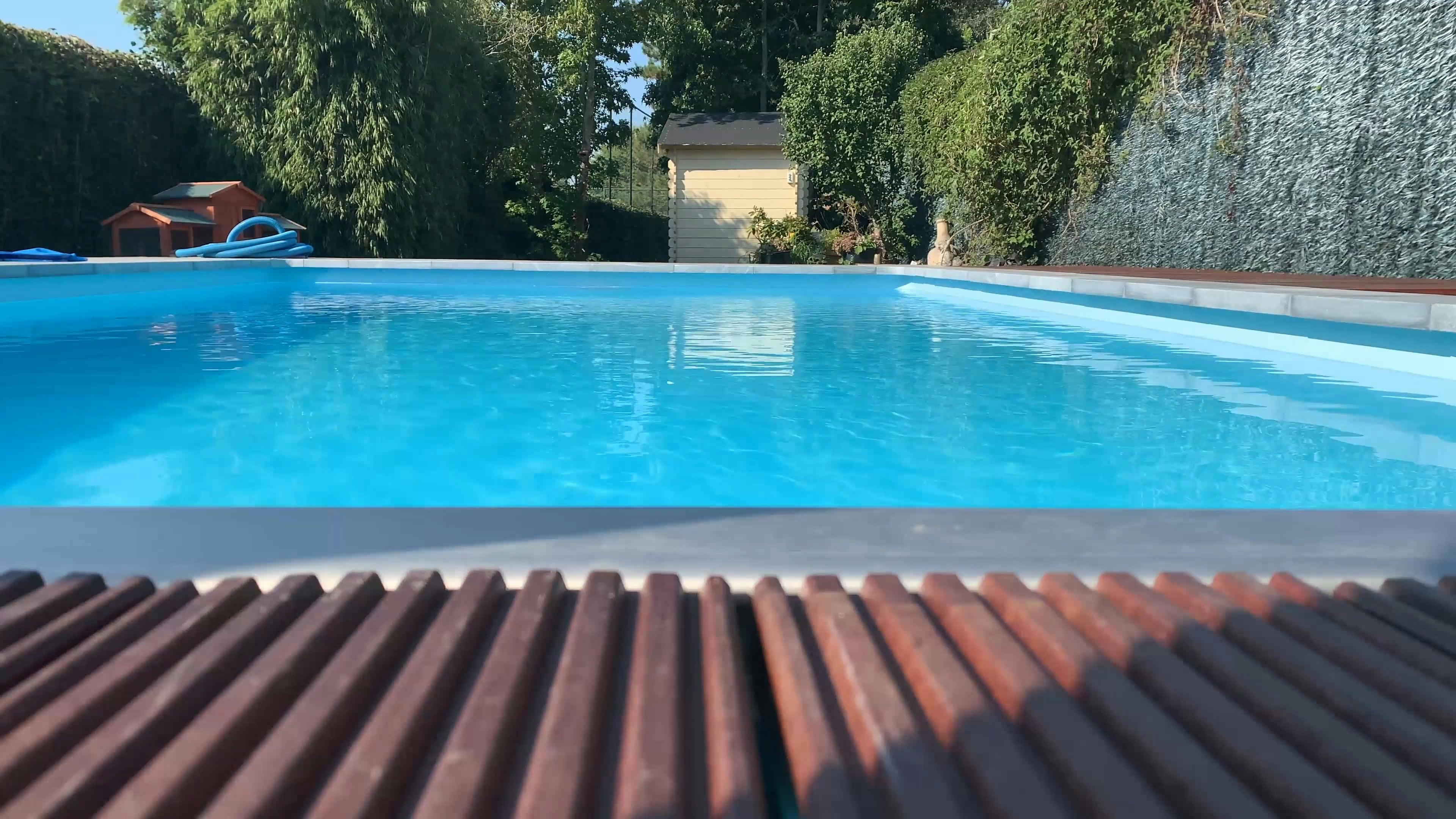 Top View Footage Of Someone Diving In The Pool · Free Stock Video