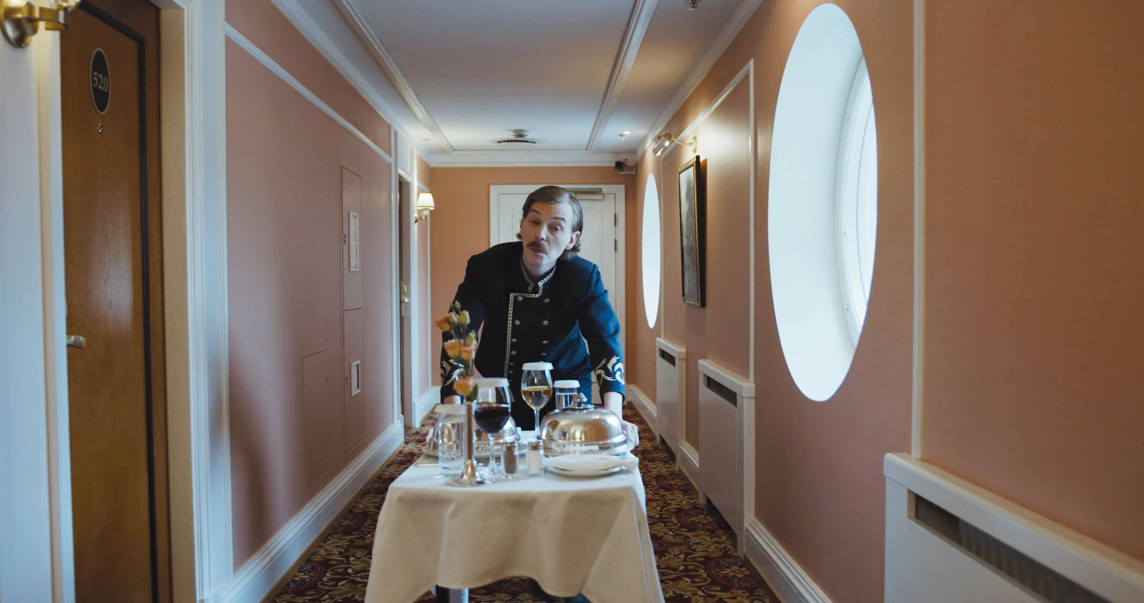 Young Man Pushing Room Service Trolley · Free Stock Video
