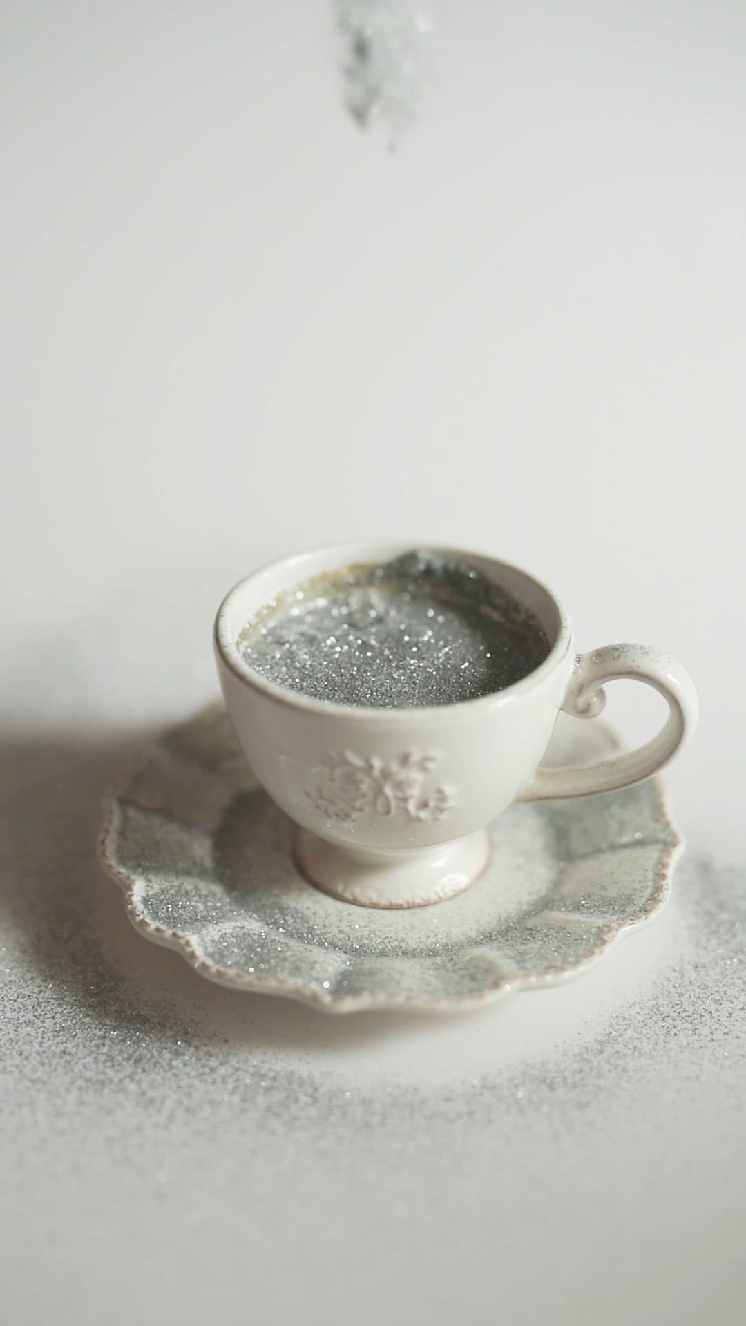 A Coffee Cup Sprinkled by Silver Glitters Free Stock Video Footage ...