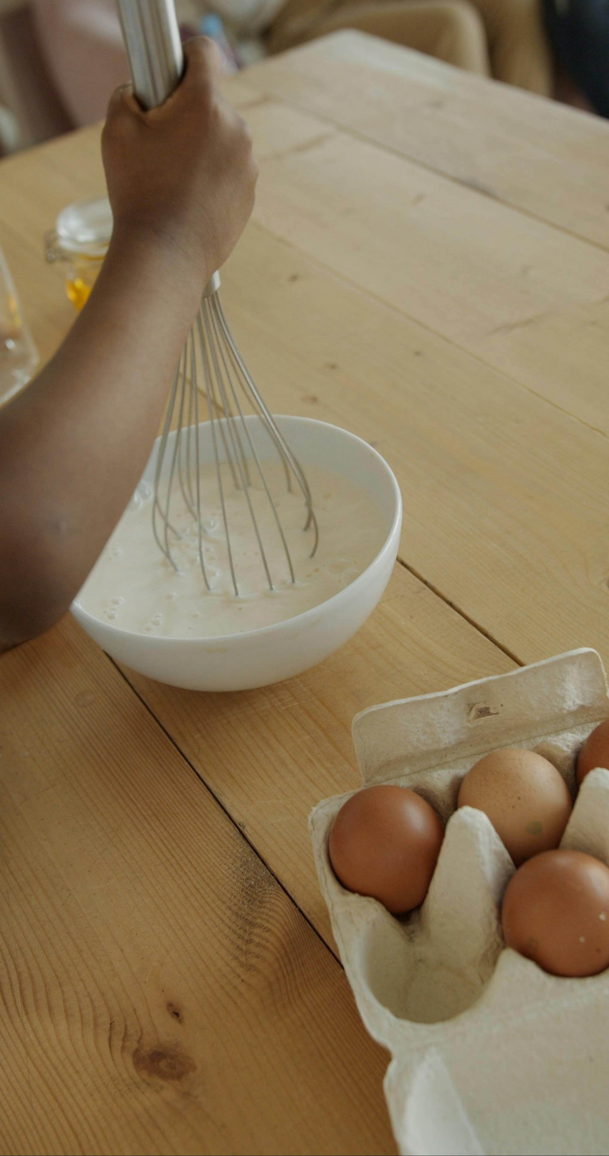 A Person's Hand Using Whisk for Stirring Free Stock Video Footage ...