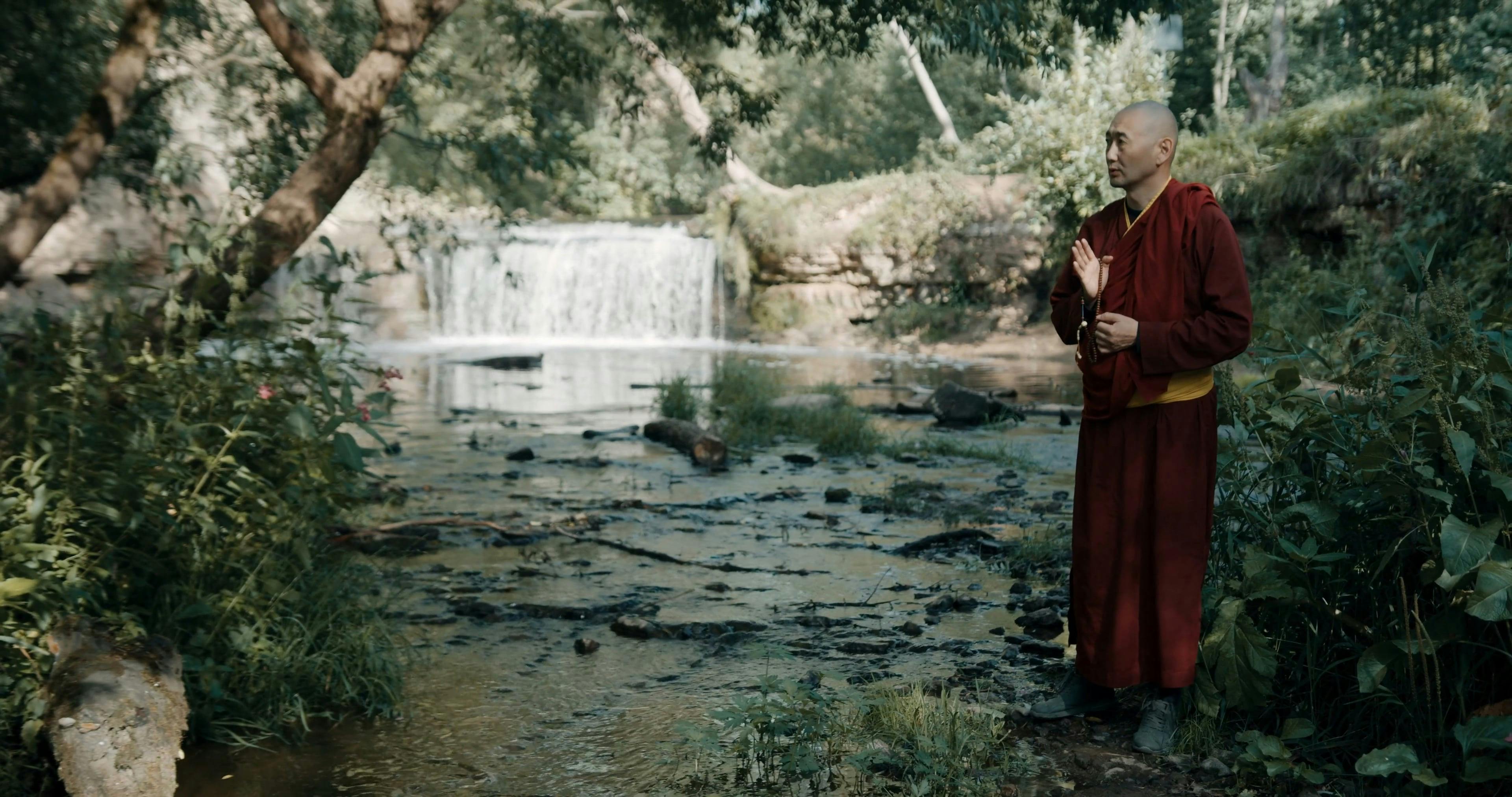 Tibetan Monk Praying Next to Waterfall Free Stock Video Footage ...