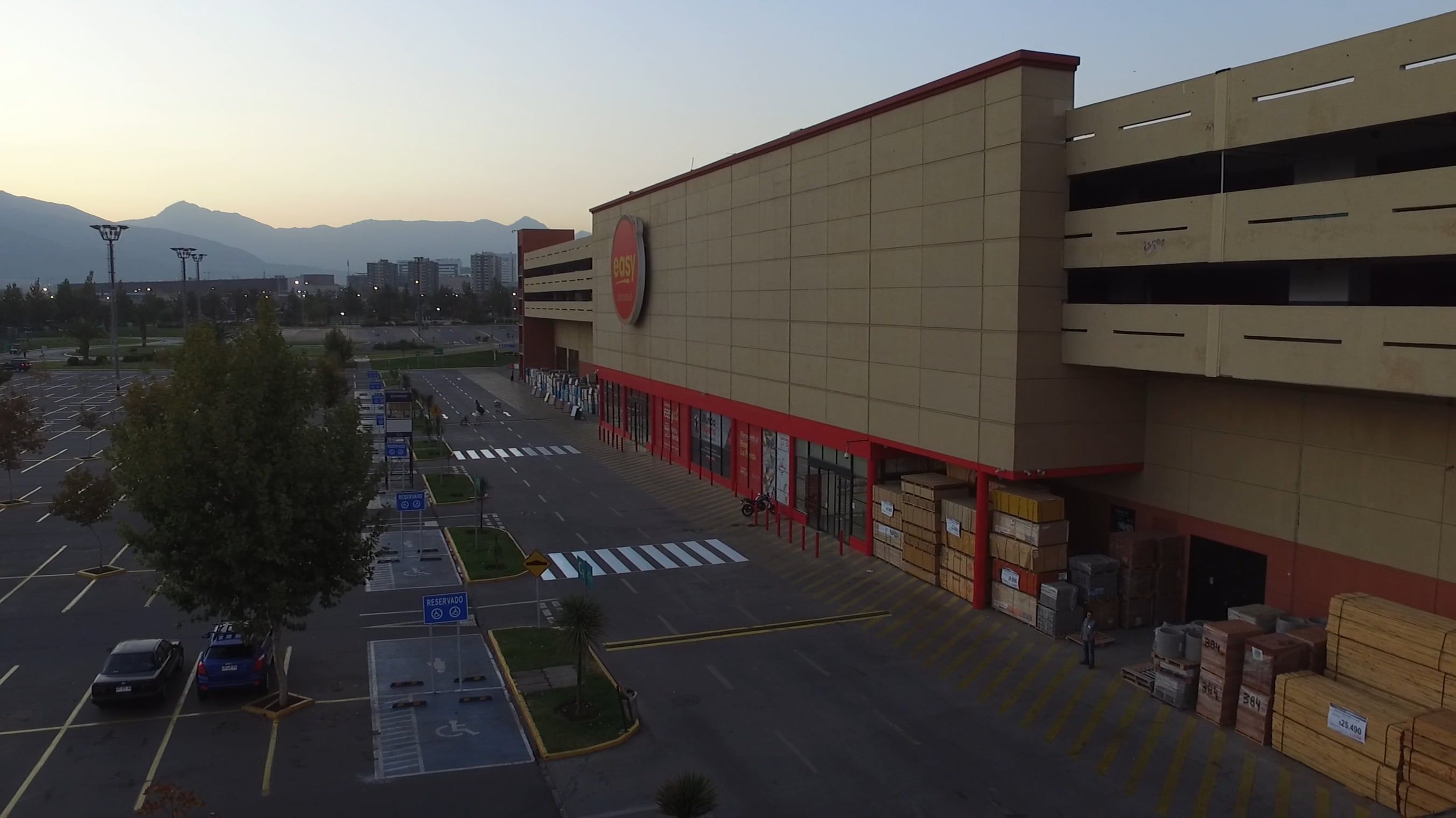 An Aerial Footage of a Commercial Building with a Parking Lot Free ...
