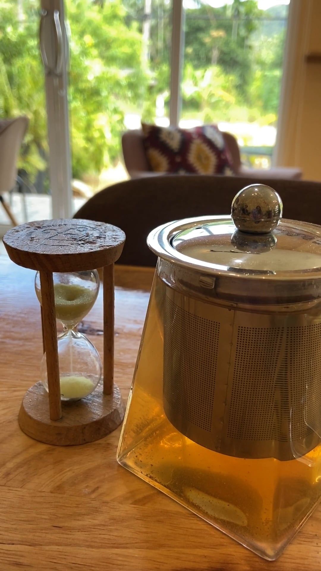 Using an Hourglass to Time Making Tea in an Infuser · Free Stock Video