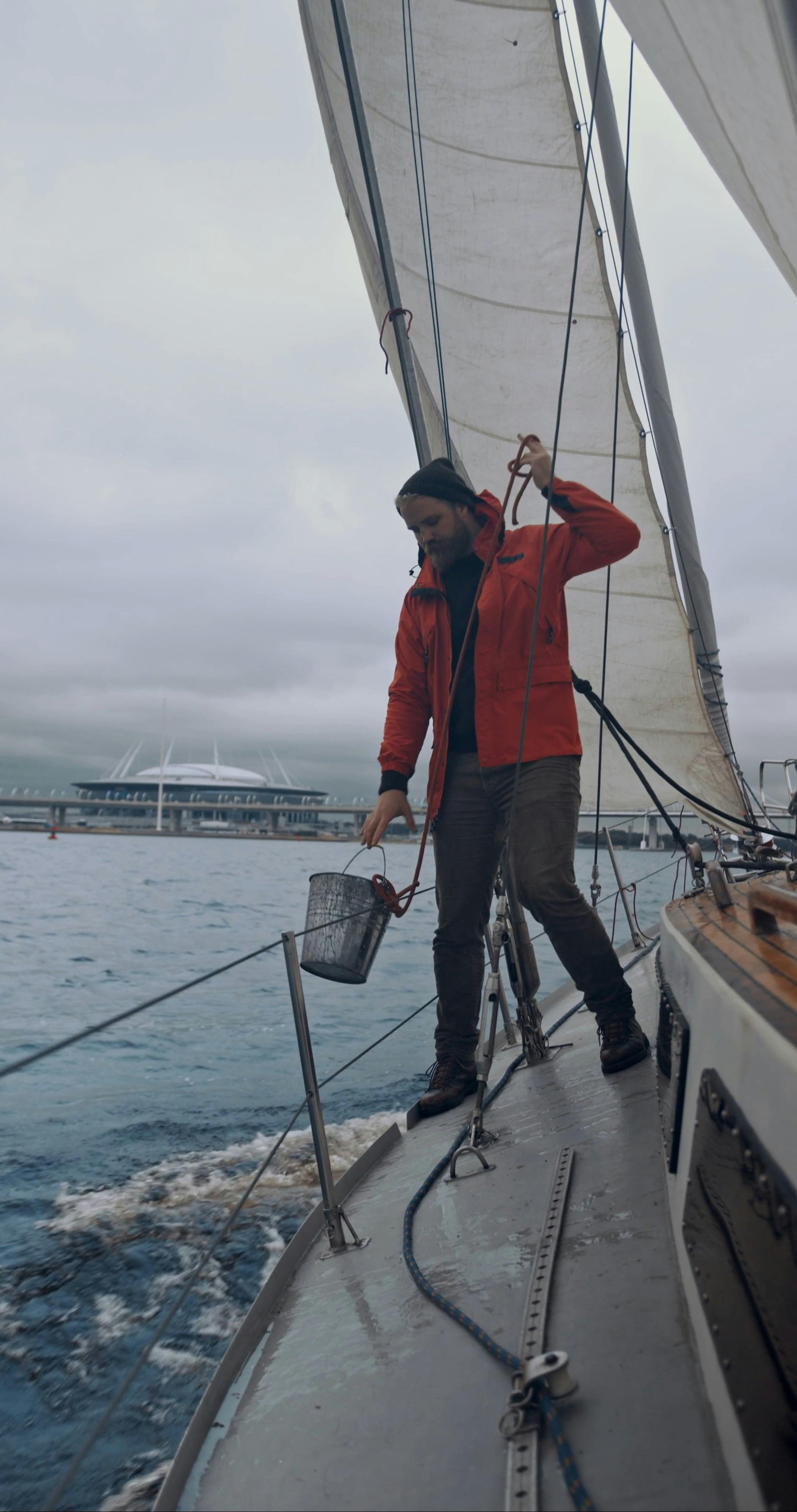Man Getting Water on the Sea using Bucket Free Stock Video Footage ...