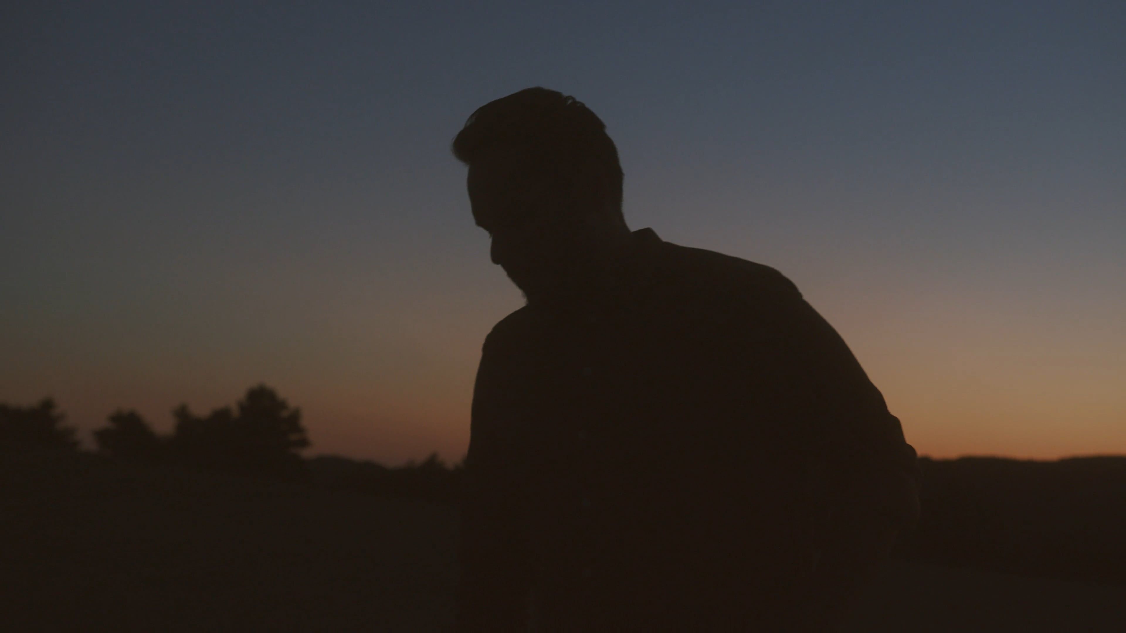 Silhouette of a Man in Sunset Background Free Stock Video Footage ...