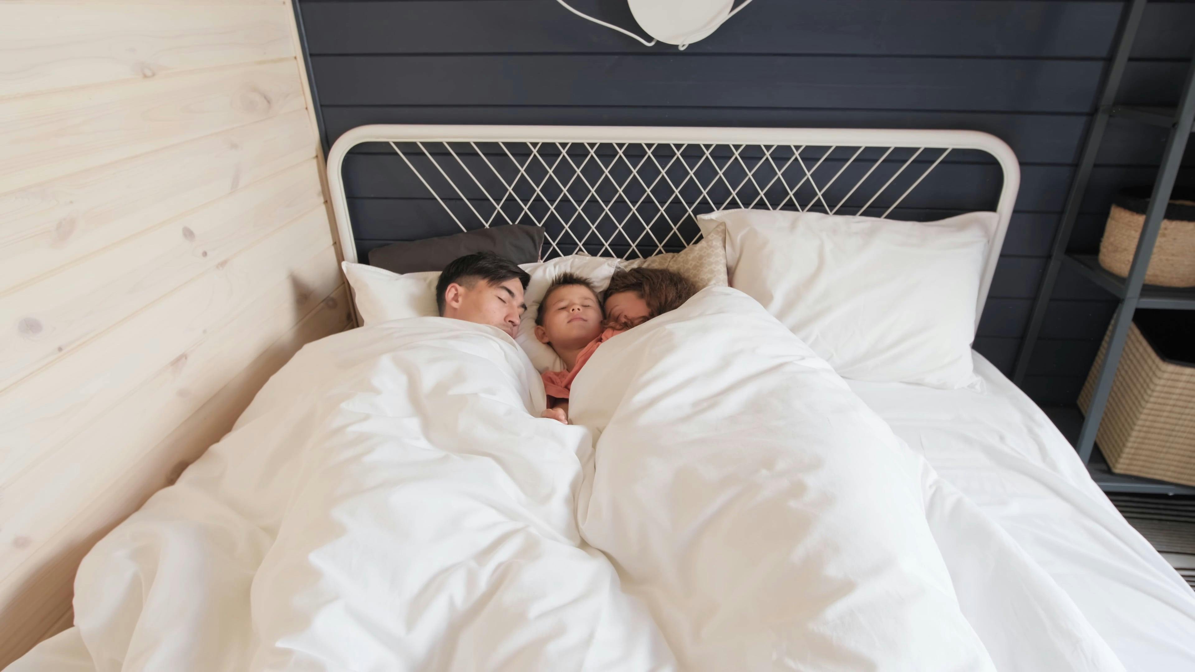 Parents and Child Sleeping Together Free Stock Video Footage, Royalty ...