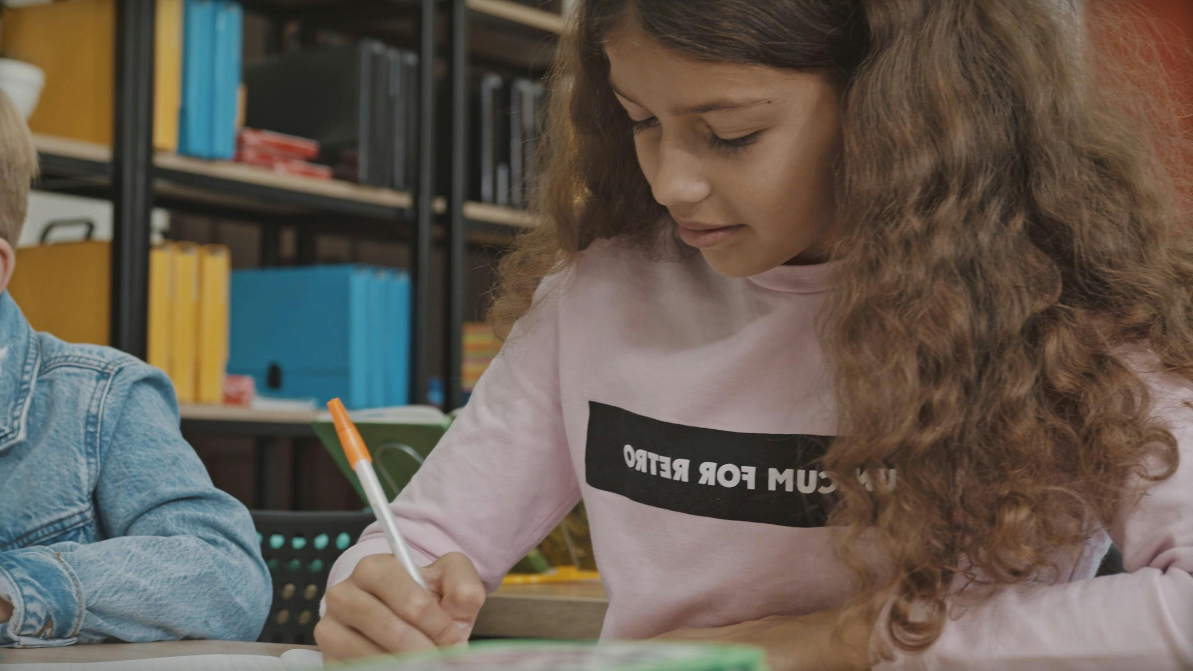 Students Writing in Class · Free Stock Video