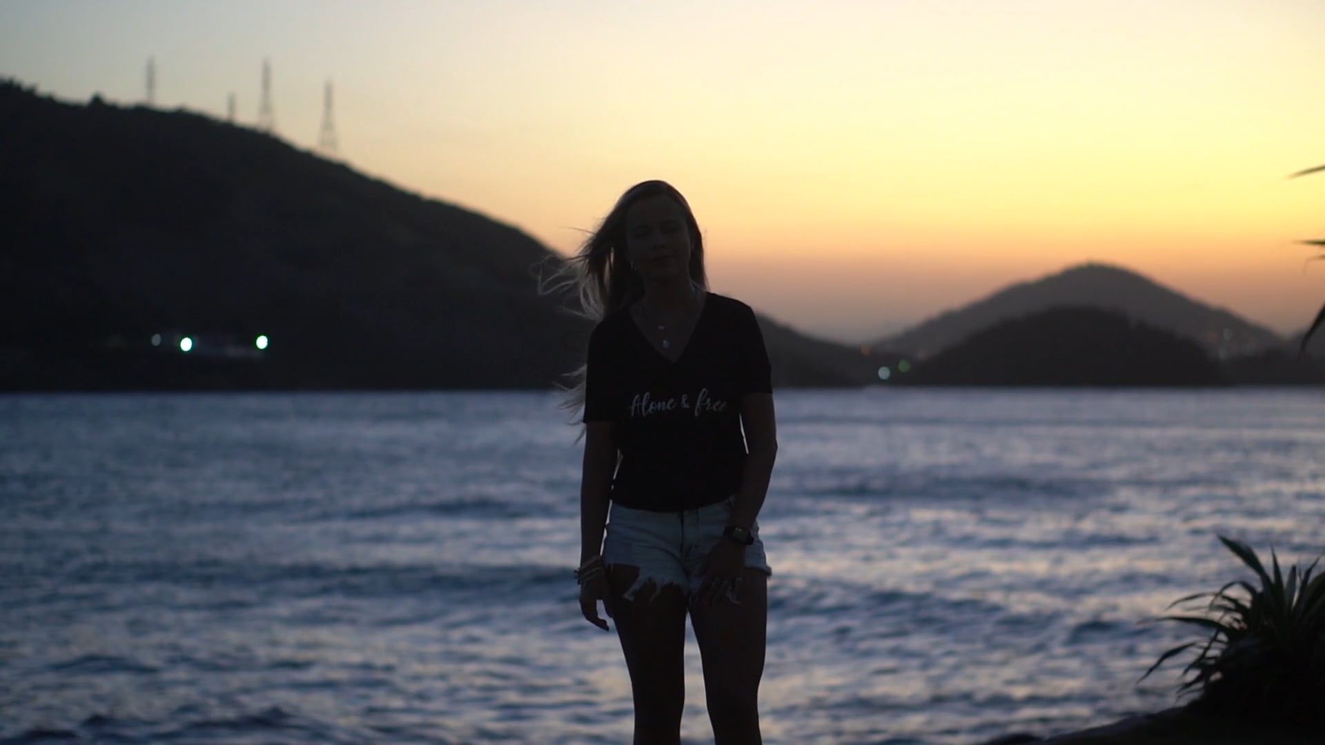 Woman Standing at the Shore · Free Stock Video