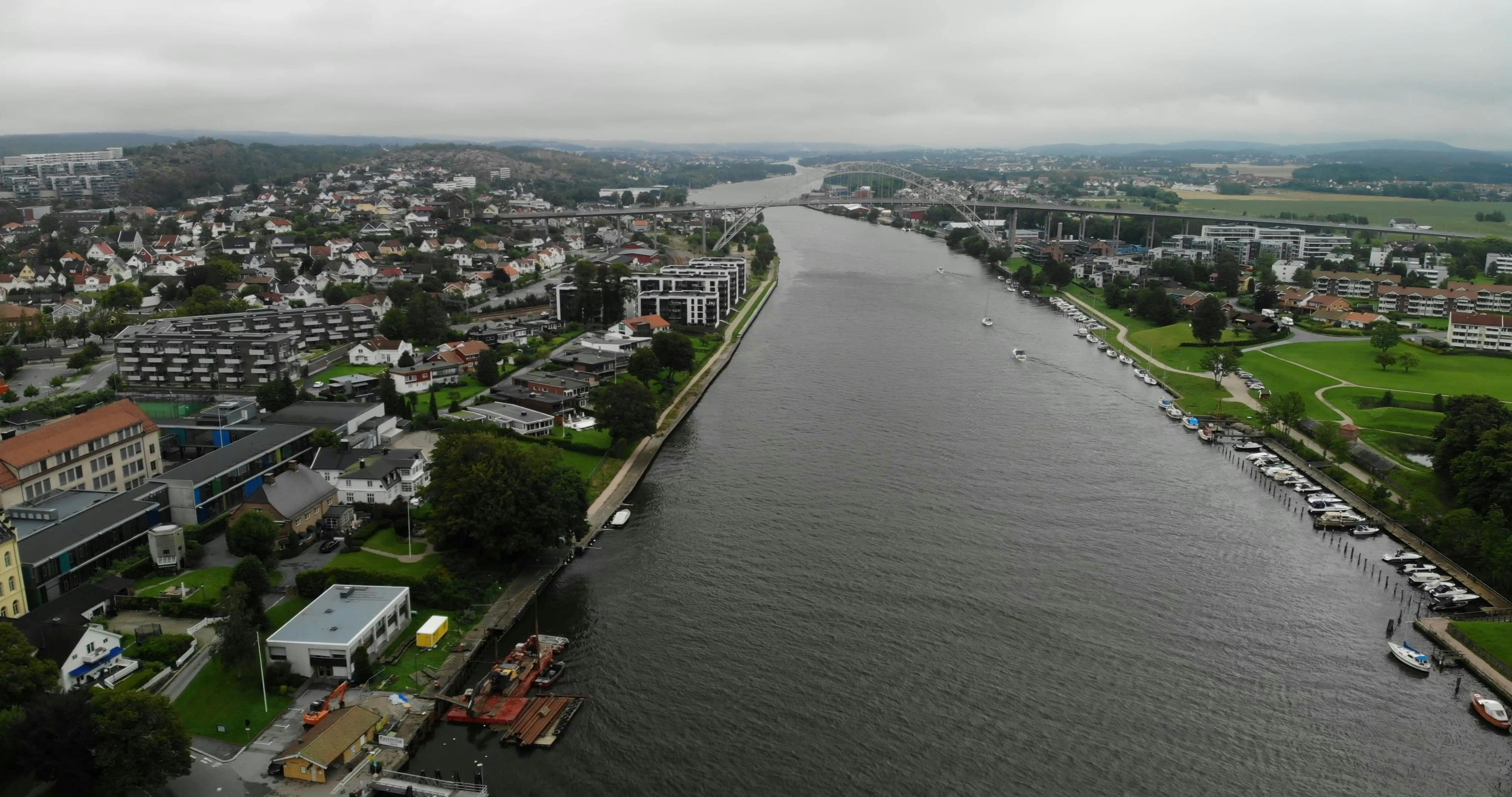 Drone Footage of a Town on the Riverside · Free Stock Video